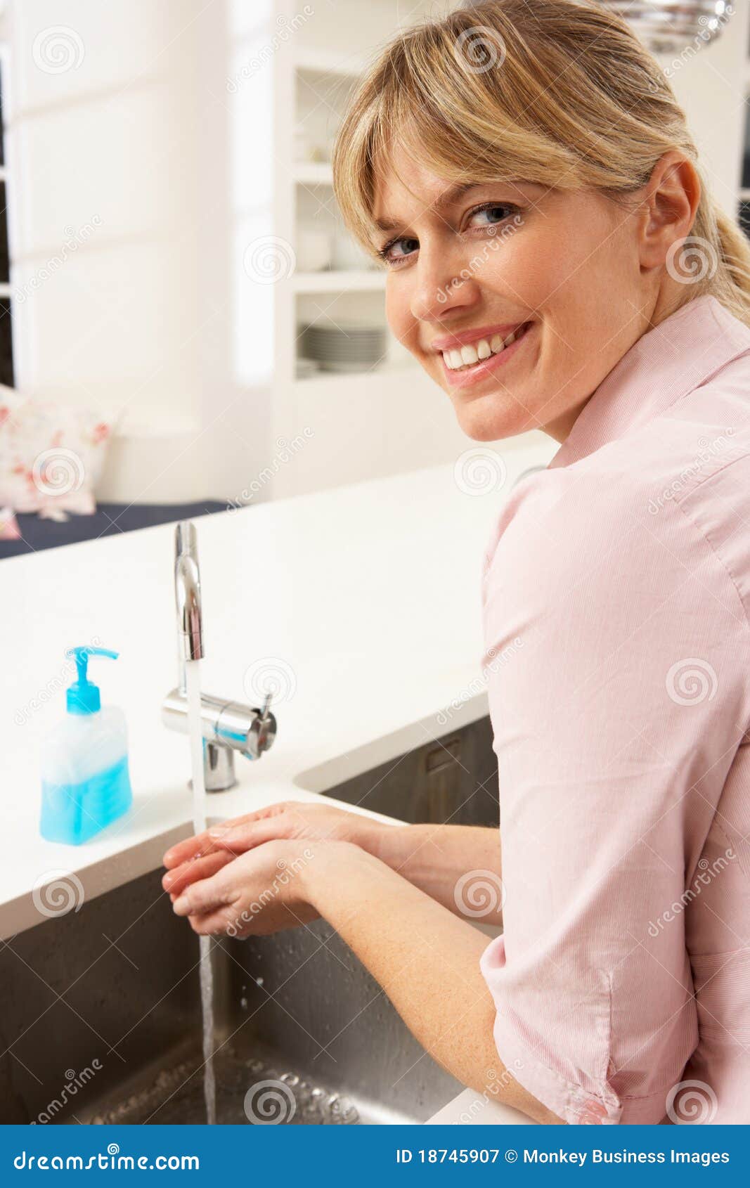 Woman Washing Hands at Kitchen Sink Stock Image - Image of sink ...