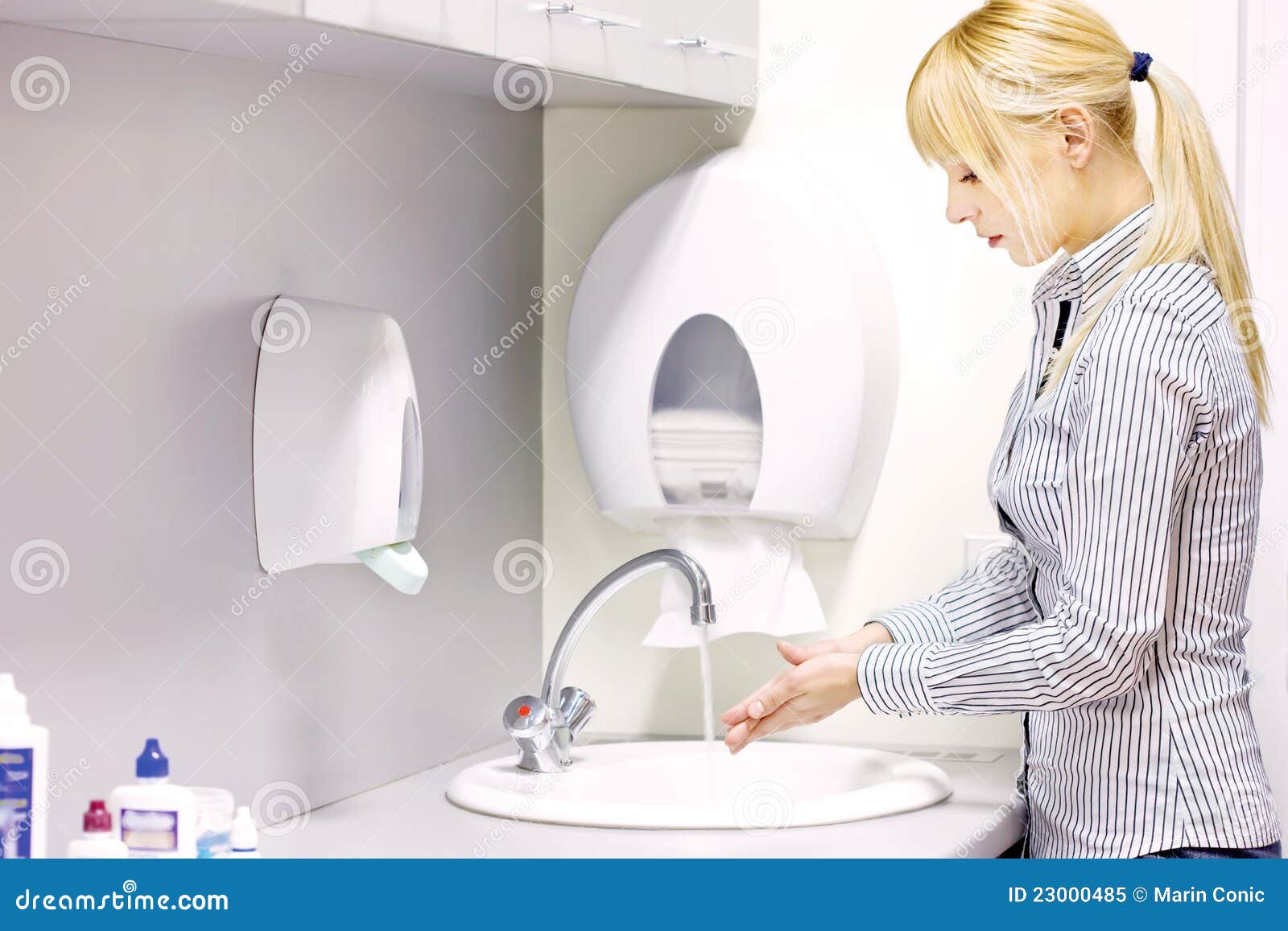 Woman Washing Hands in Restroom Stock Image - Image of washroom, female ...