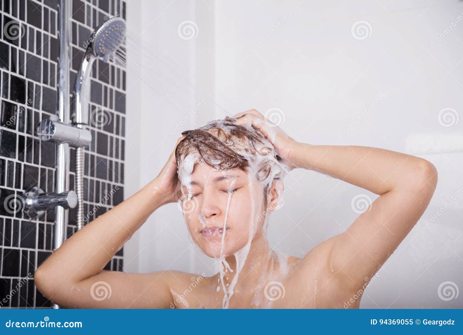 Woman Washing Head And Hair In The Shower By Shampoo Stock Image