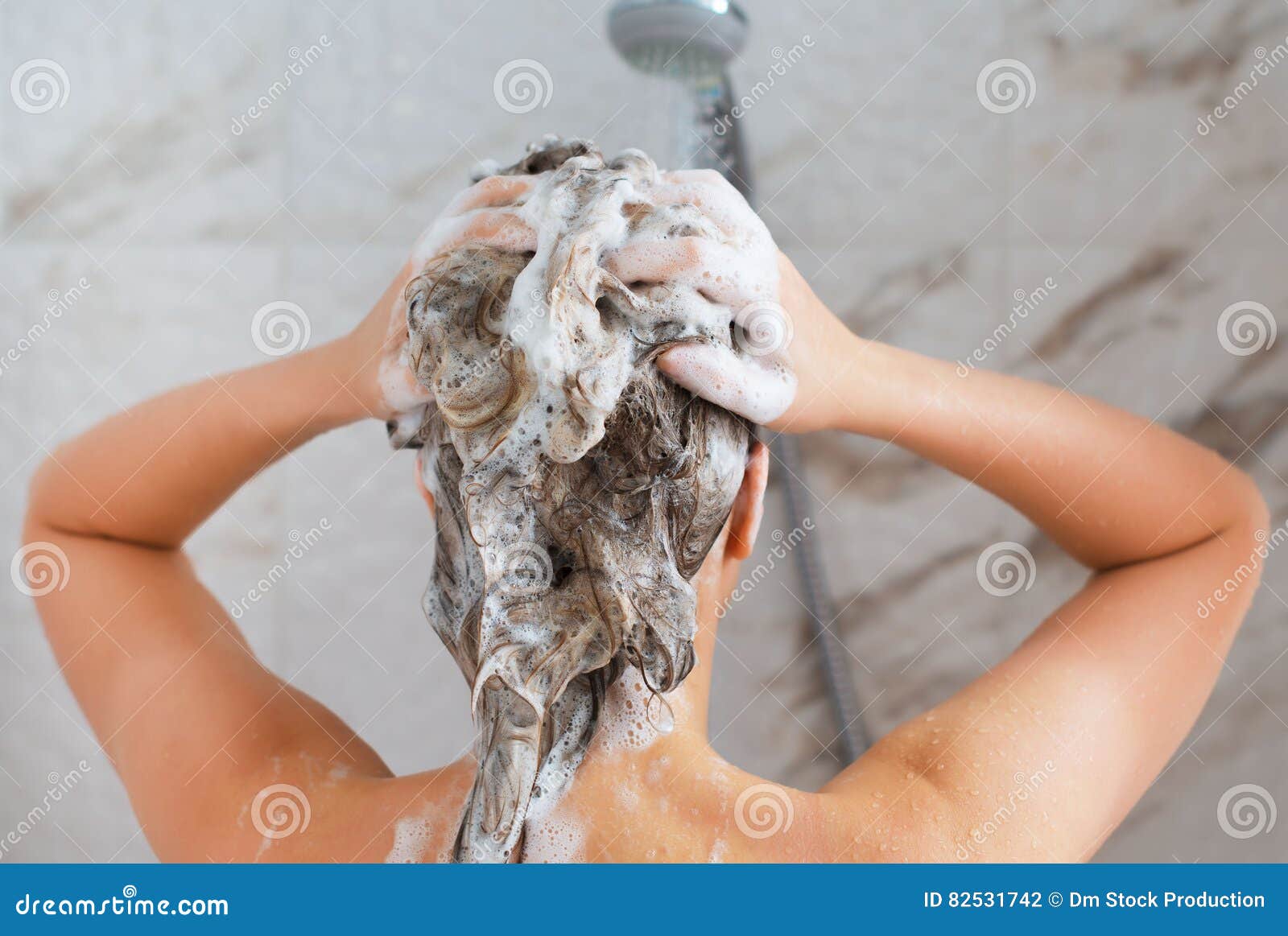 Woman washing her head. stock photo. Image of beauty - 82531742
