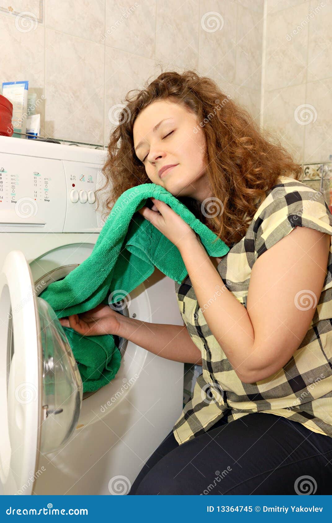 Woman with washing machine stock image. Image of adult - 13364745