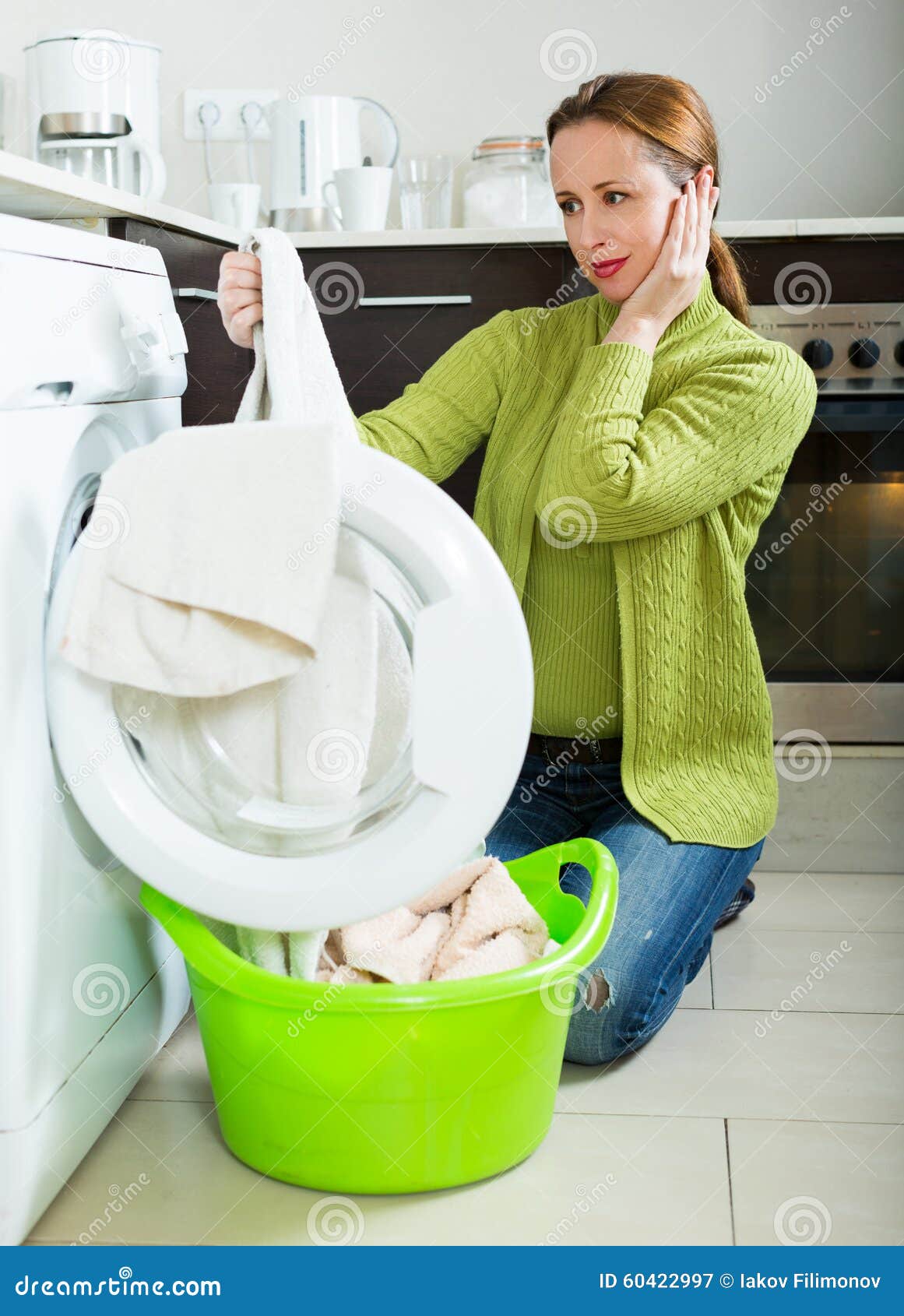 Woman with washing machine stock image. Image of domestic - 60422997