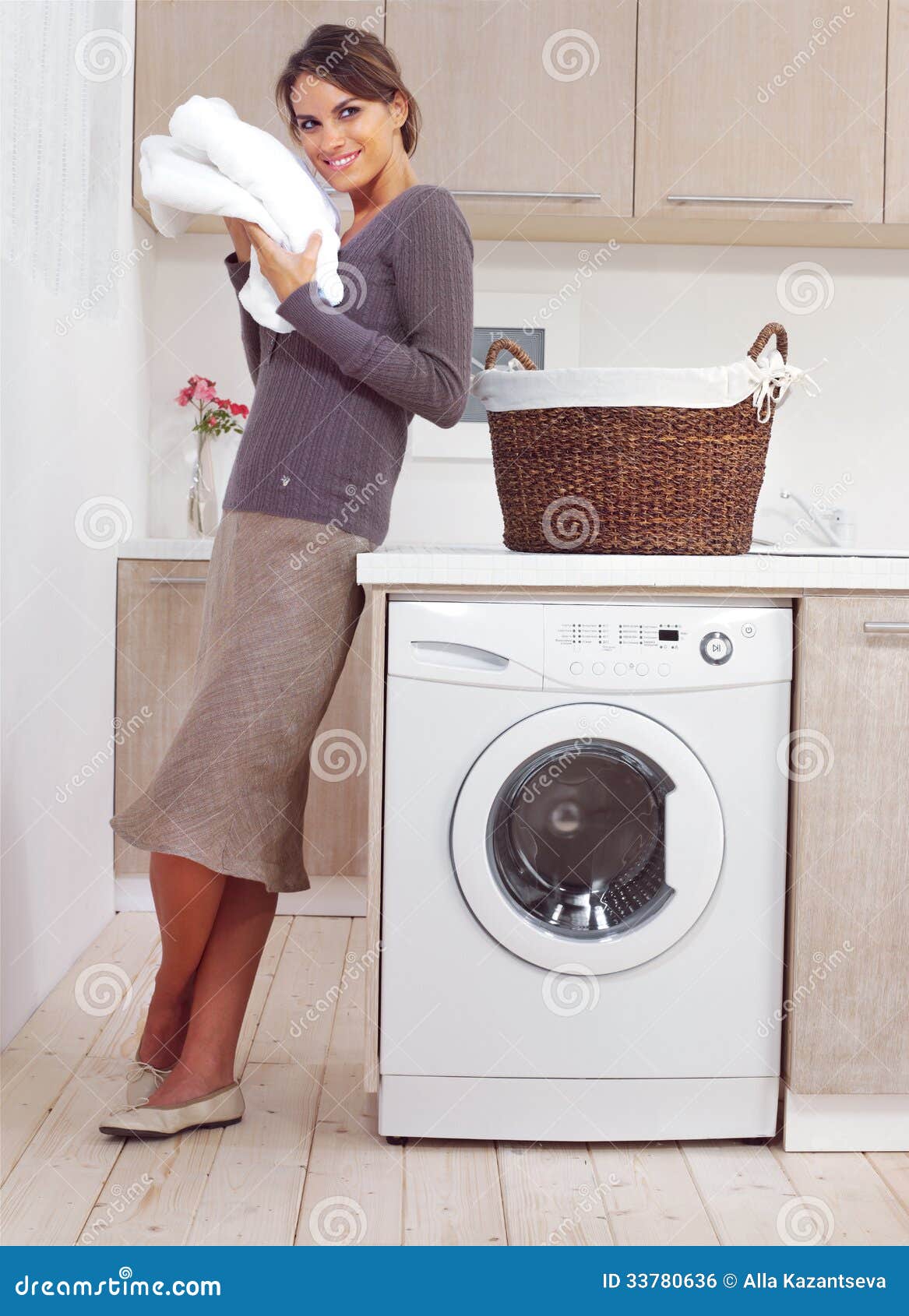 Woman on washing machine stock photo. Image of product - 33780636