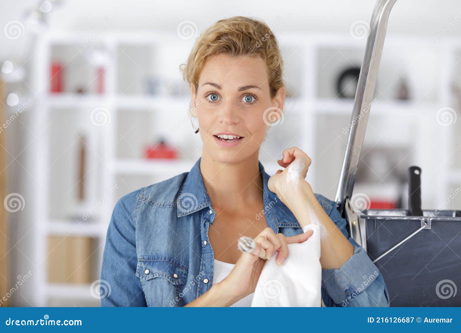 Woman washing off paint stock image. Image of infection - 216126687