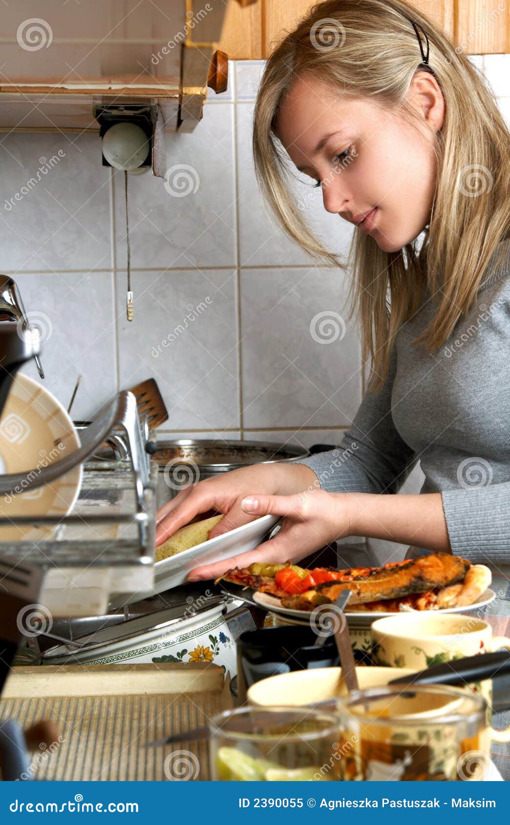 Woman washing plates stock image. Image of female, homemaker - 2390055