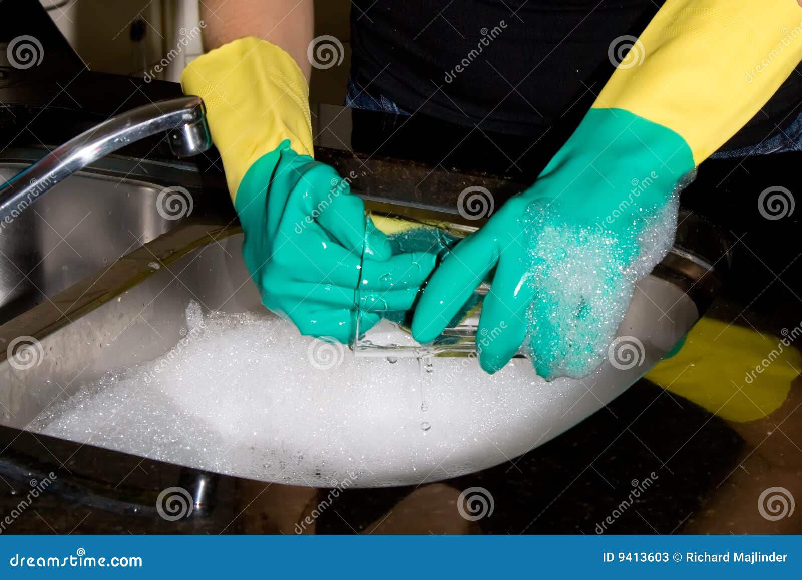 Woman washing up a glass stock image. Image of cleaning - 9413603