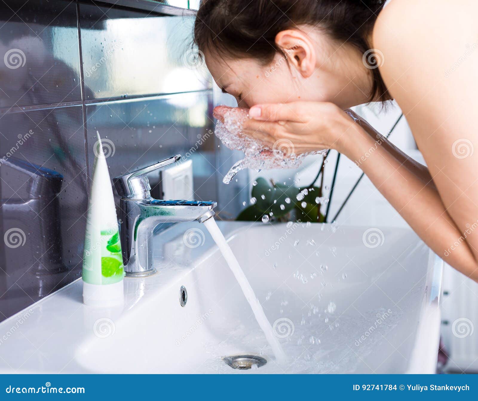 Woman Washing Up in the Morning Stock Photo - Image of care, home: 92741784