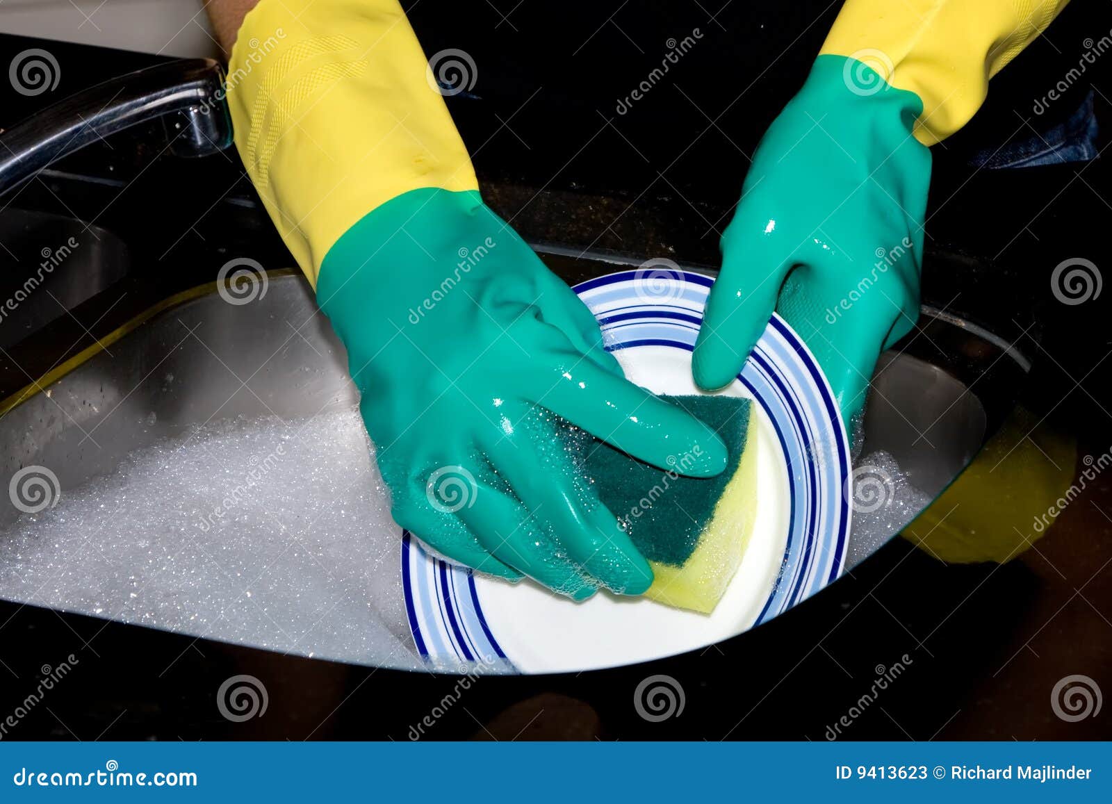 Woman washing up a plate stock image. Image of house, housewife - 9413623
