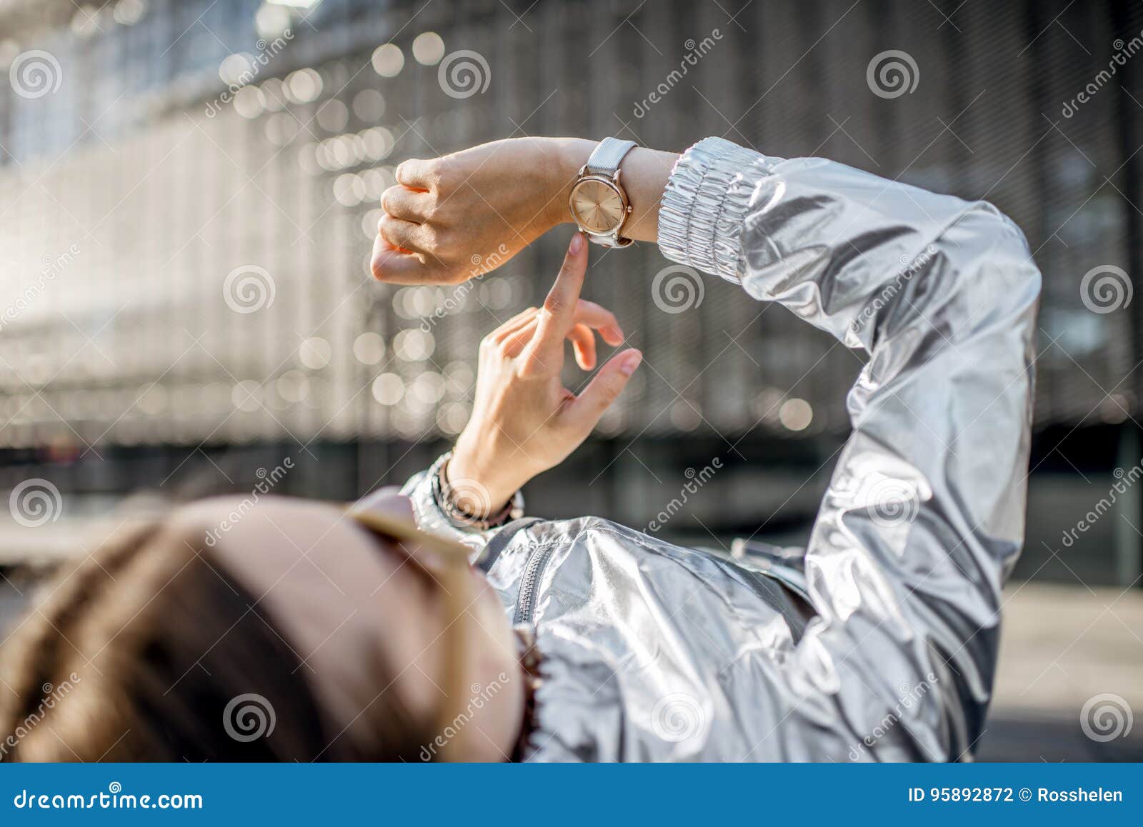Woman watching the clock stock photo. Image of look, futuristic - 95892872