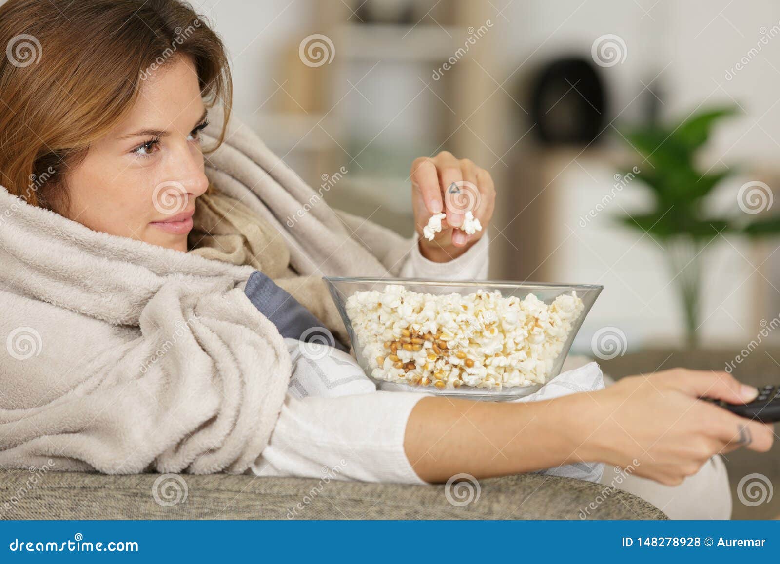 Woman Watching Television and Eating Popcorn Stock Photo - Image of ...