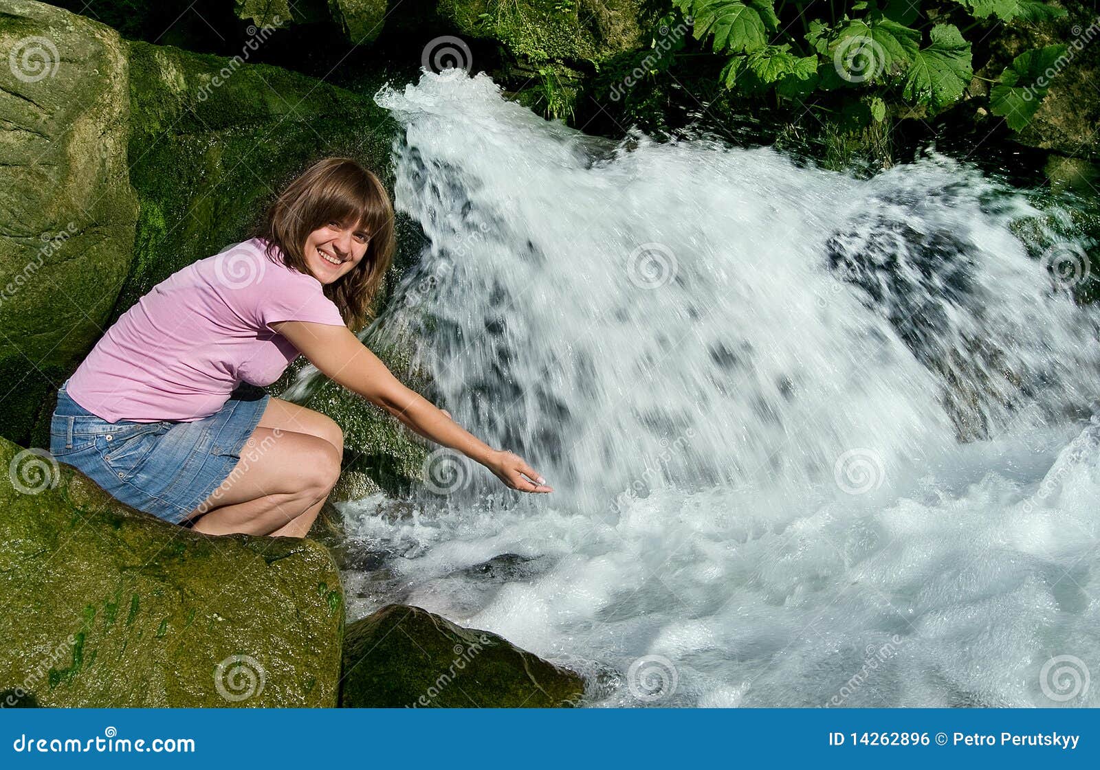 Woman and waterfall stock photo. Image of falling, moss - 14262896