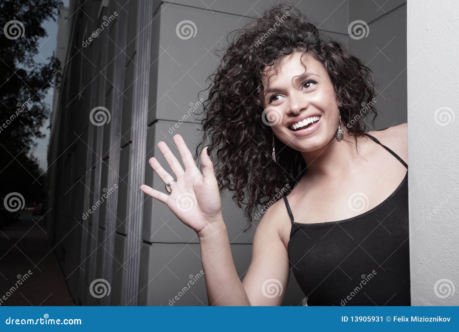 Woman waving with a smile stock image. Image of happy - 13905931