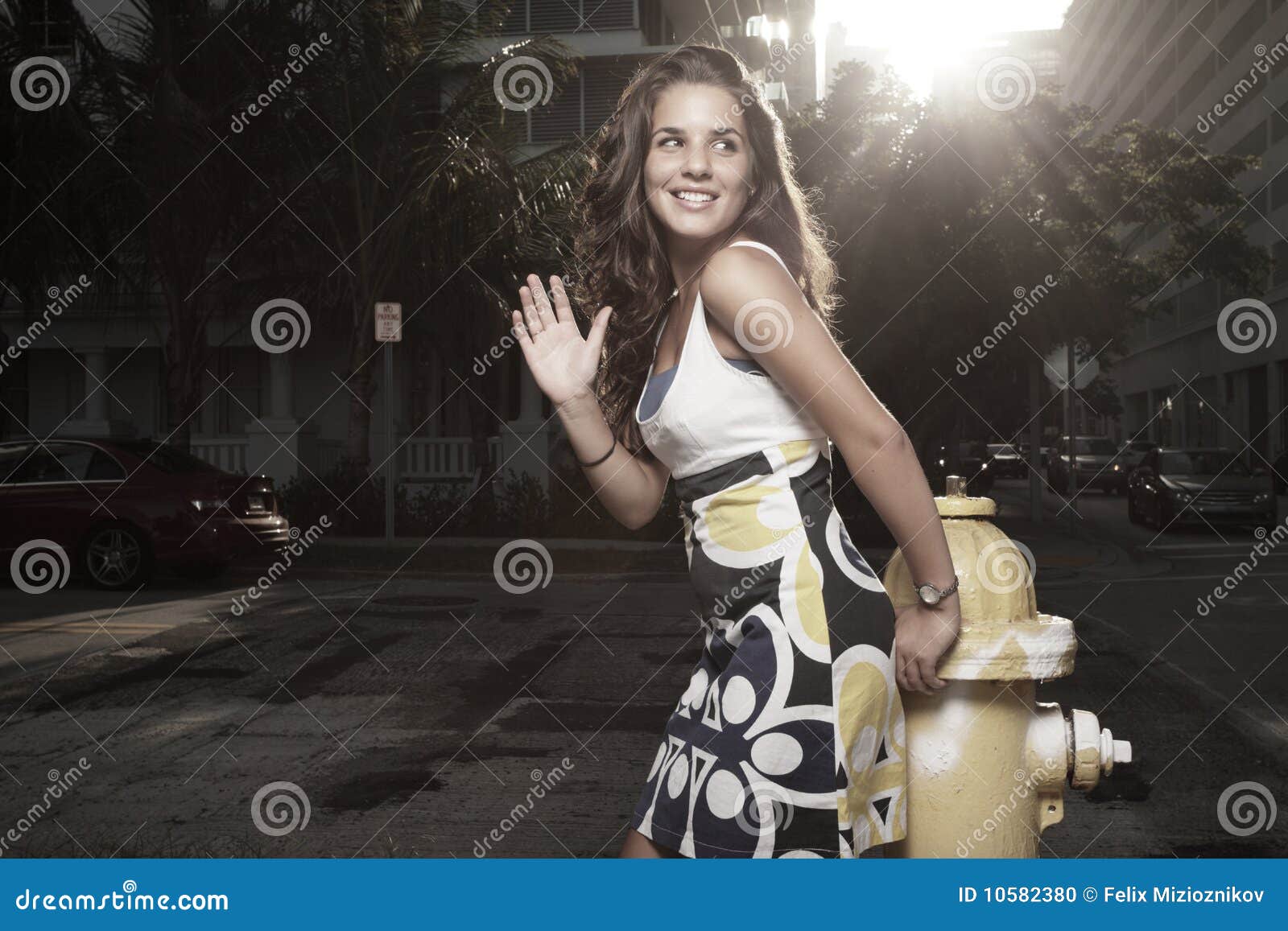 Woman waving and smiling stock photo. Image of wave, urban - 10582380