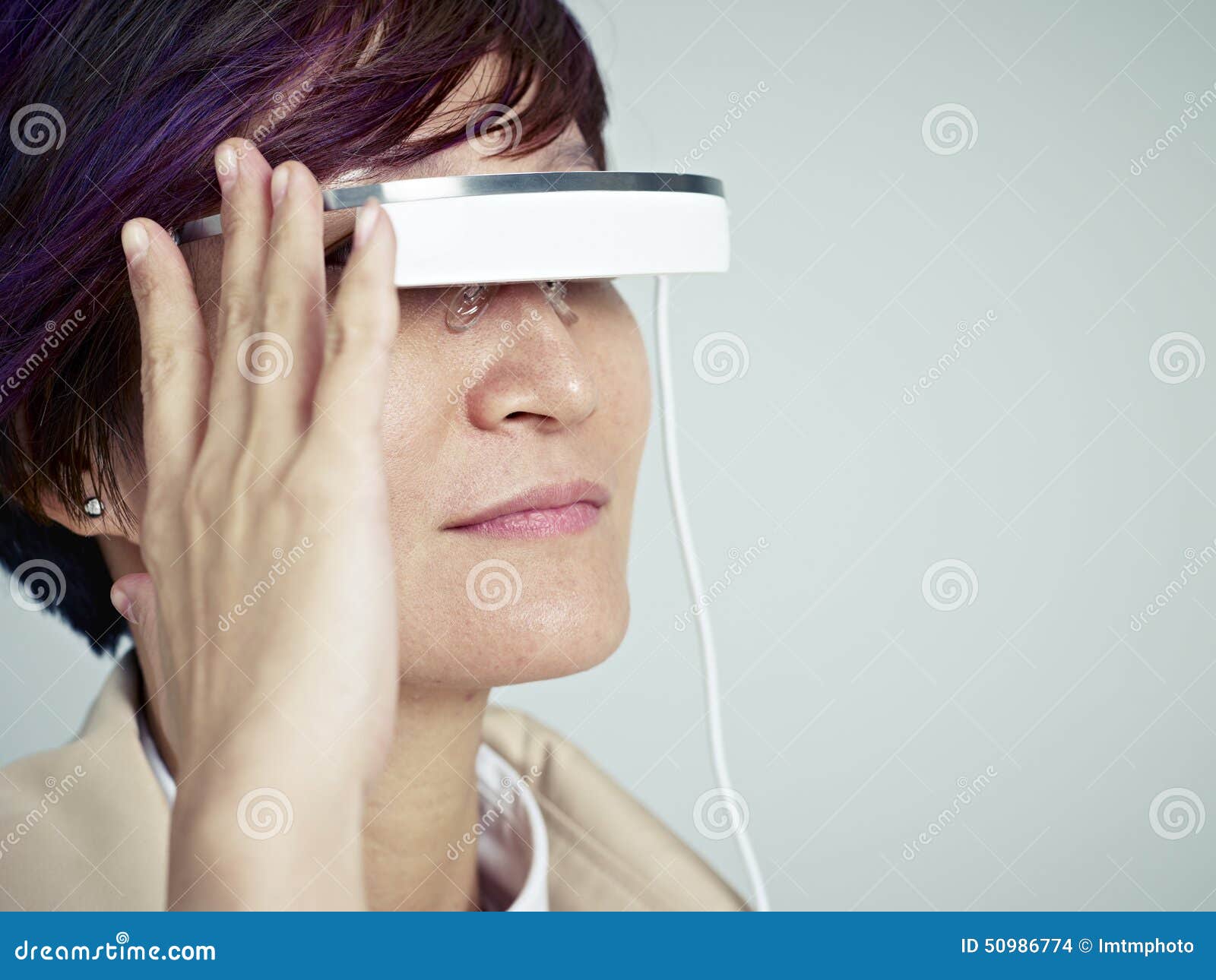Woman with wearable device stock photo. Image of girl - 50986774