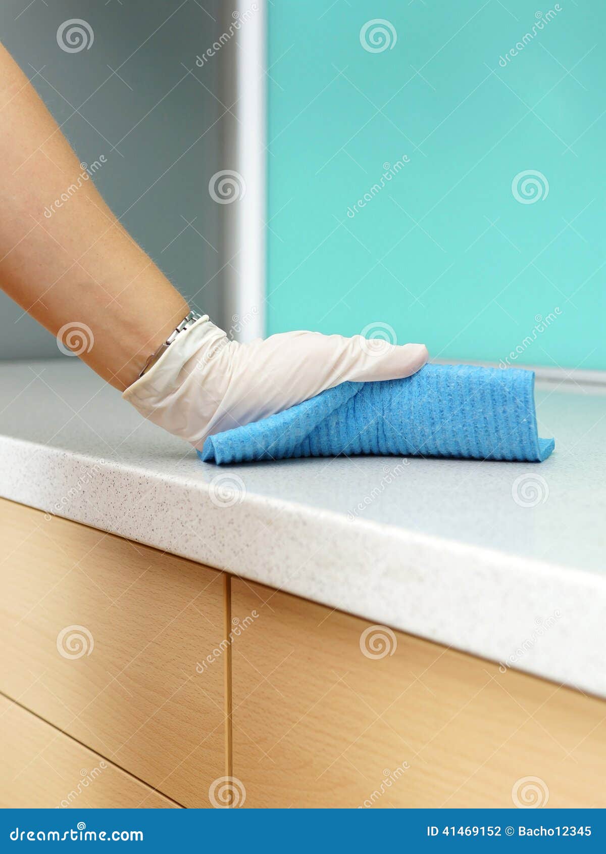 Woman Wearing Apron Cleaning Kitchen Worktop Stock Photo - Image of ...