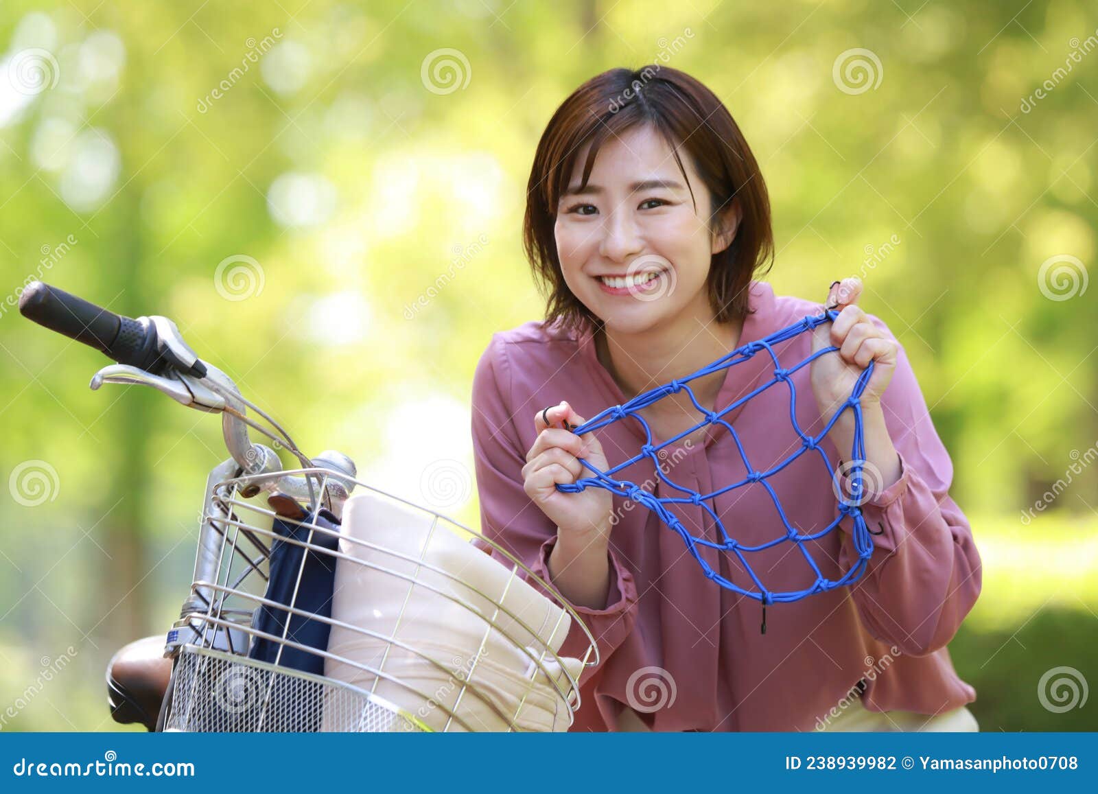 A Woman Wearing a Bicycle Net Stock Photo - Image of dress, girl: 238939982