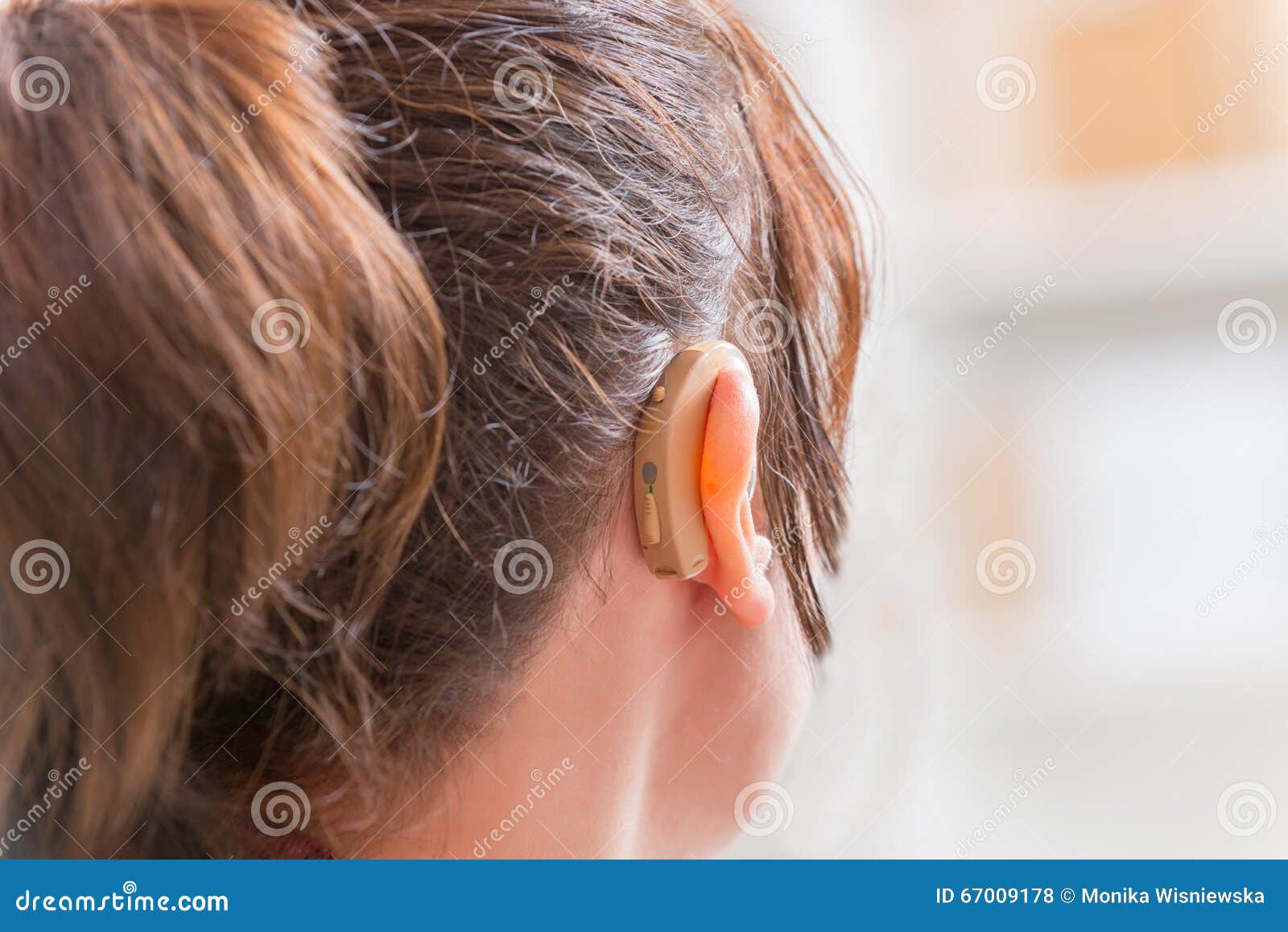 Woman wearing deaf aid stock photo. Image of hearing - 67009178
