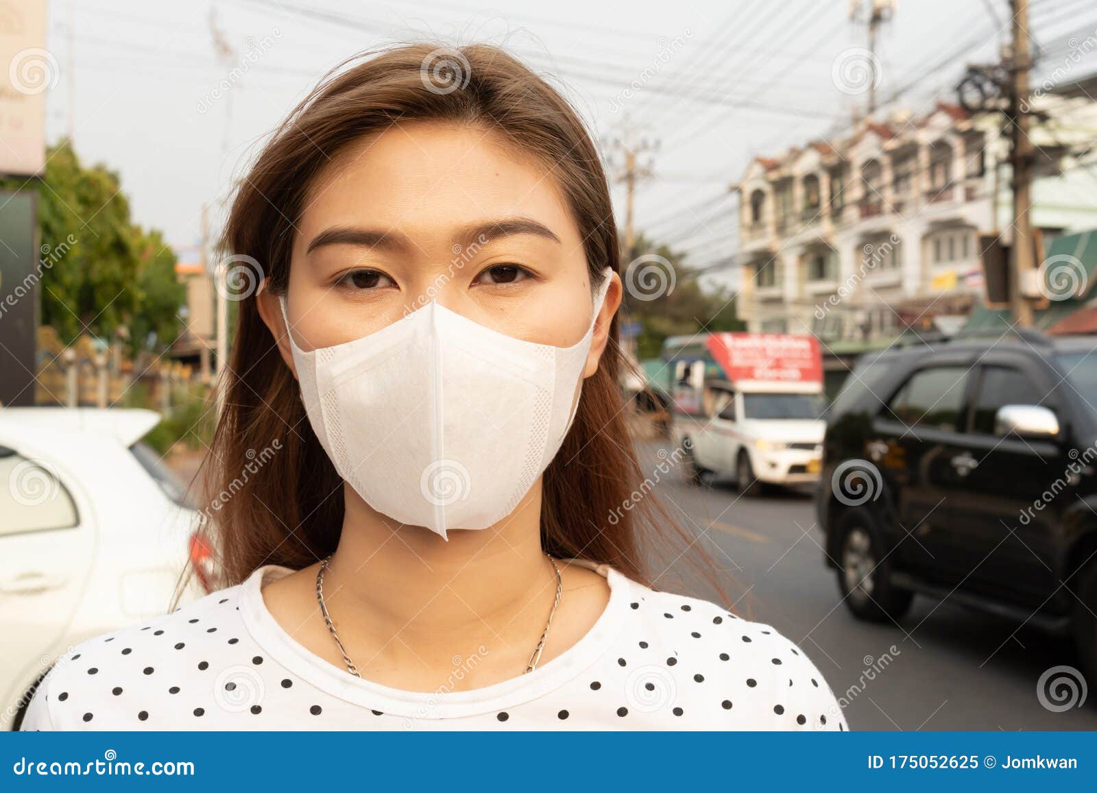 Woman Wearing Protection Mask Standing On Street With Bad Air Toxic And