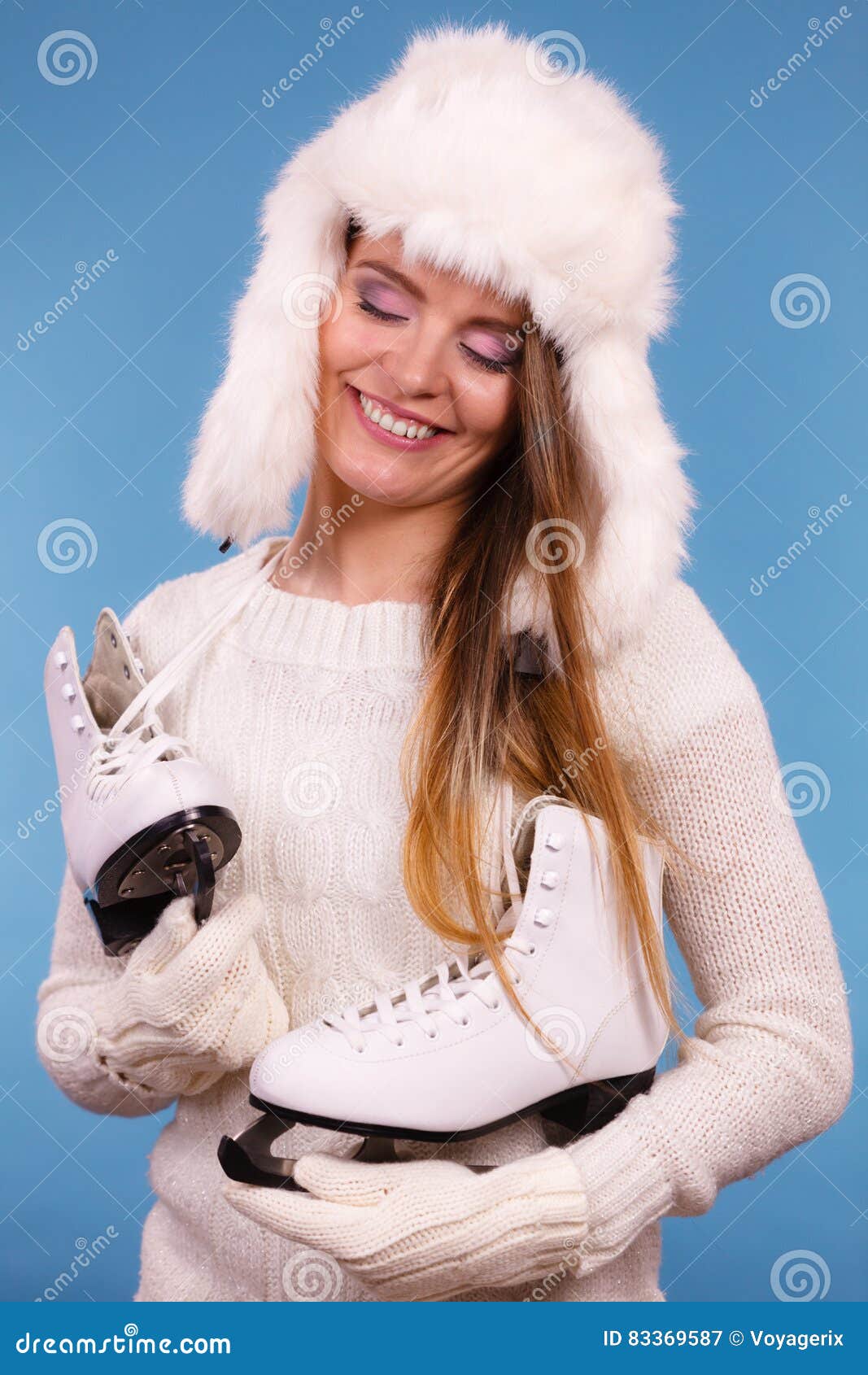 Woman Wearing Winter Hat Looking at Ice Skate Stock Image - Image of ... Woman Wearing Winter Hat Looking at Ice Skate Stock Image - Image of ...