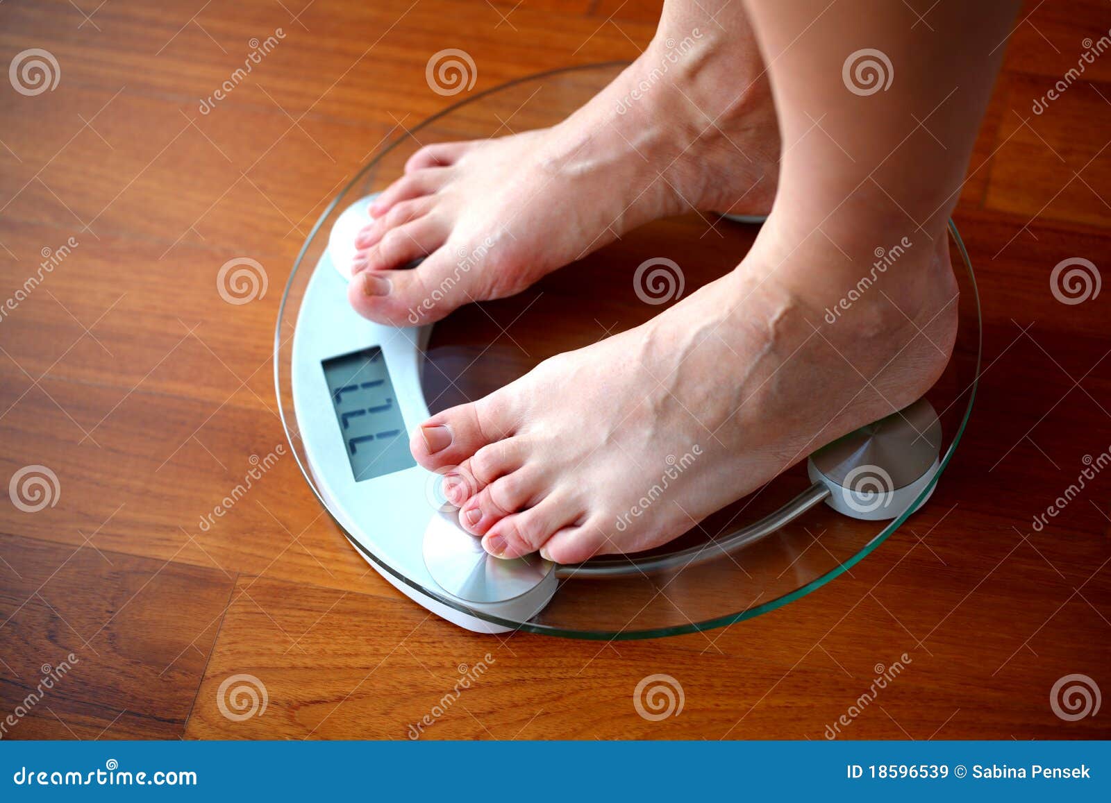 Woman Weighing Herself on the Home Scale Stock Image - Image of ...