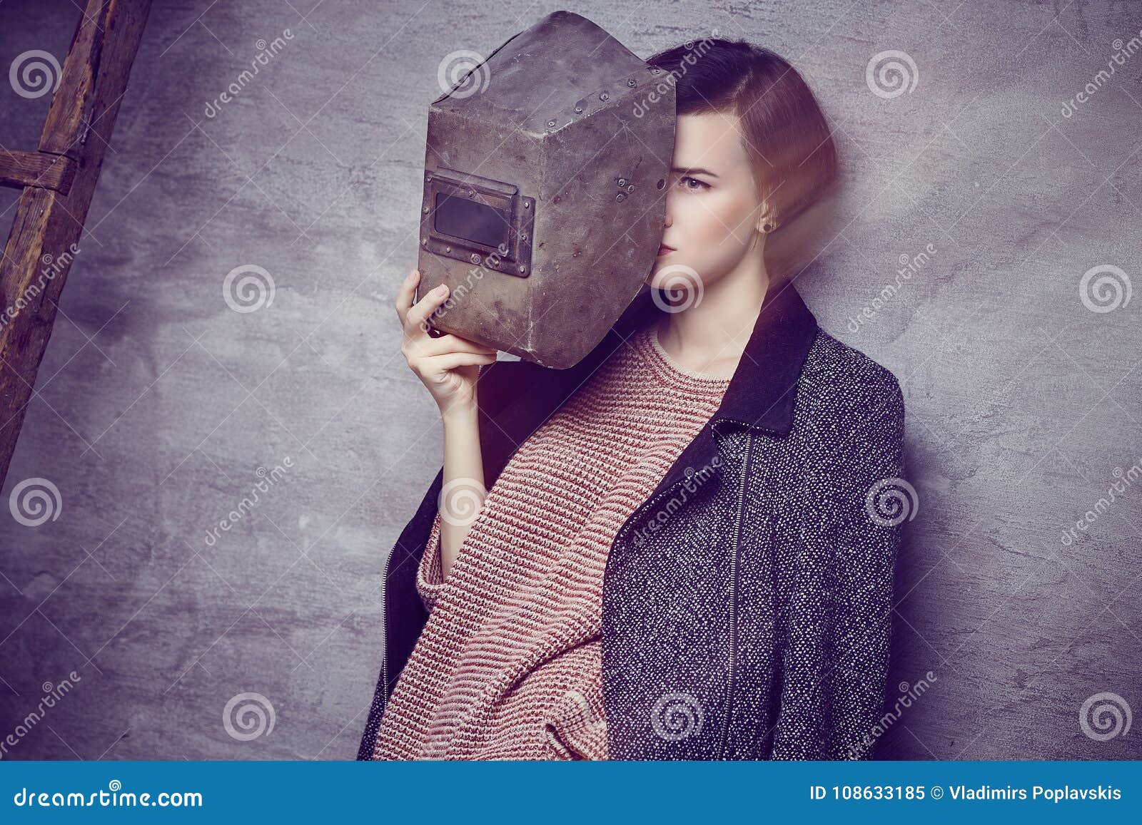 A woman in welder helmet. stock image. Image of hair - 108633185