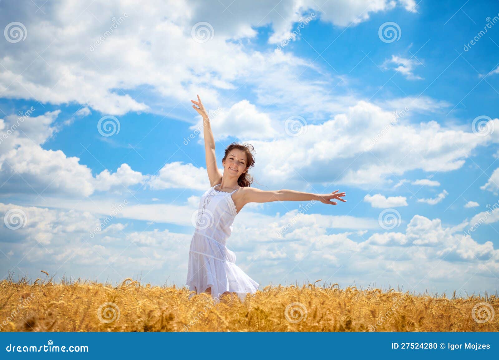 Woman in Wheat Field with Arms Outstretched Stock Photo - Image of ...