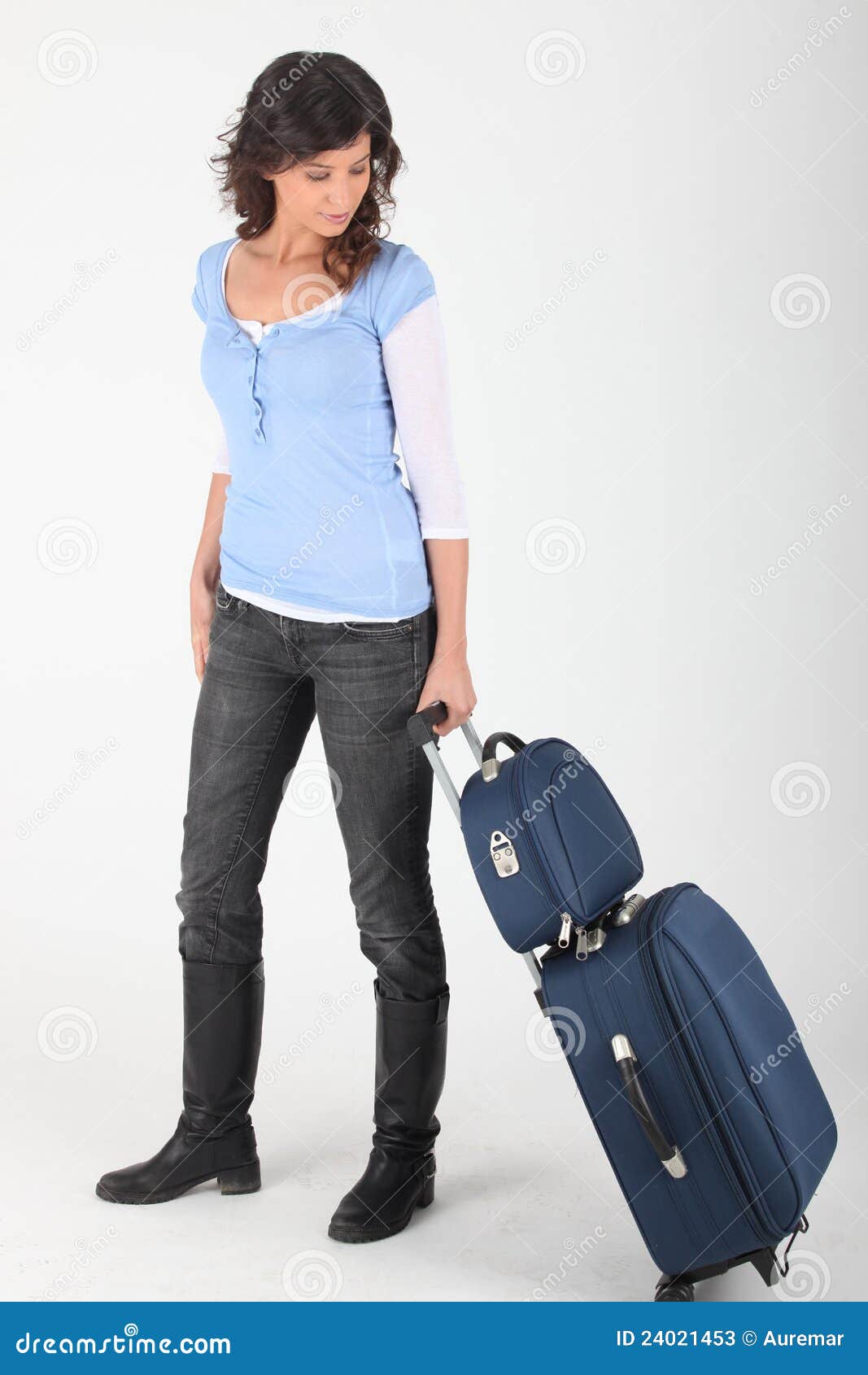Woman wheeling luggage stock image. Image of journey - 24021453