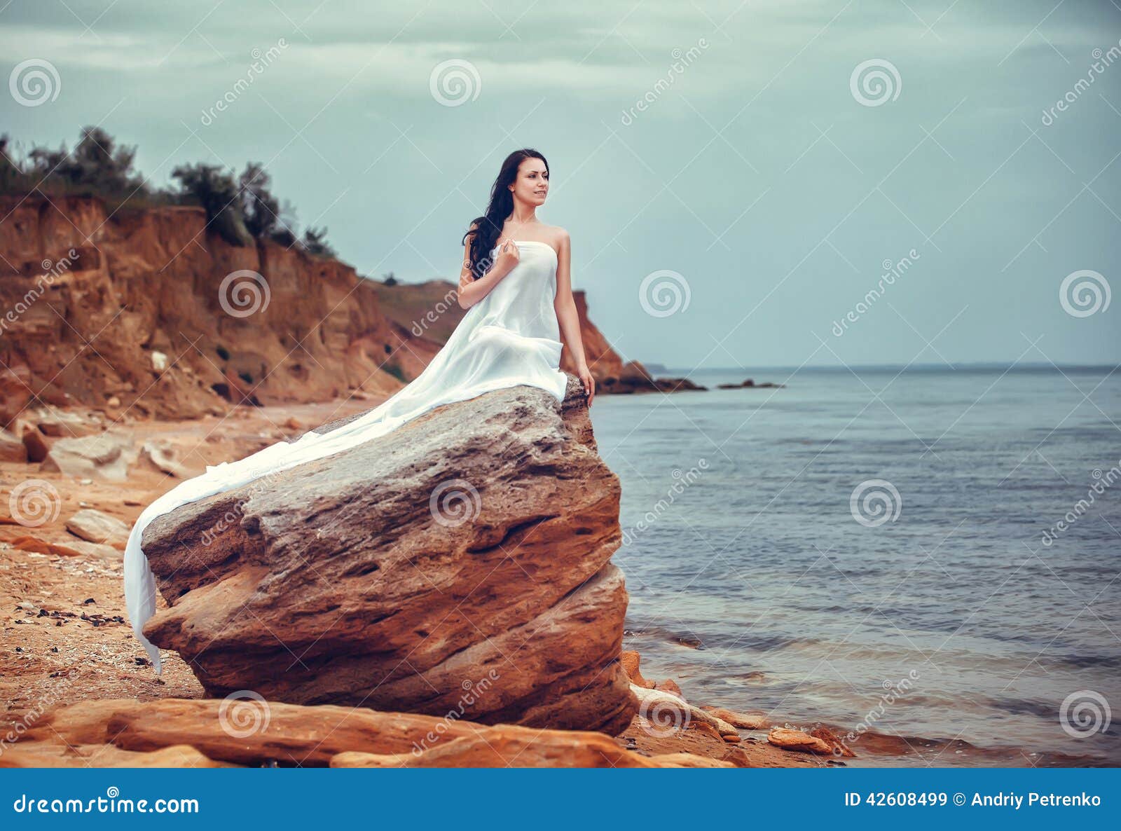 Woman in White Fabric on the Rock Stock Image - Image of blue, beach ...