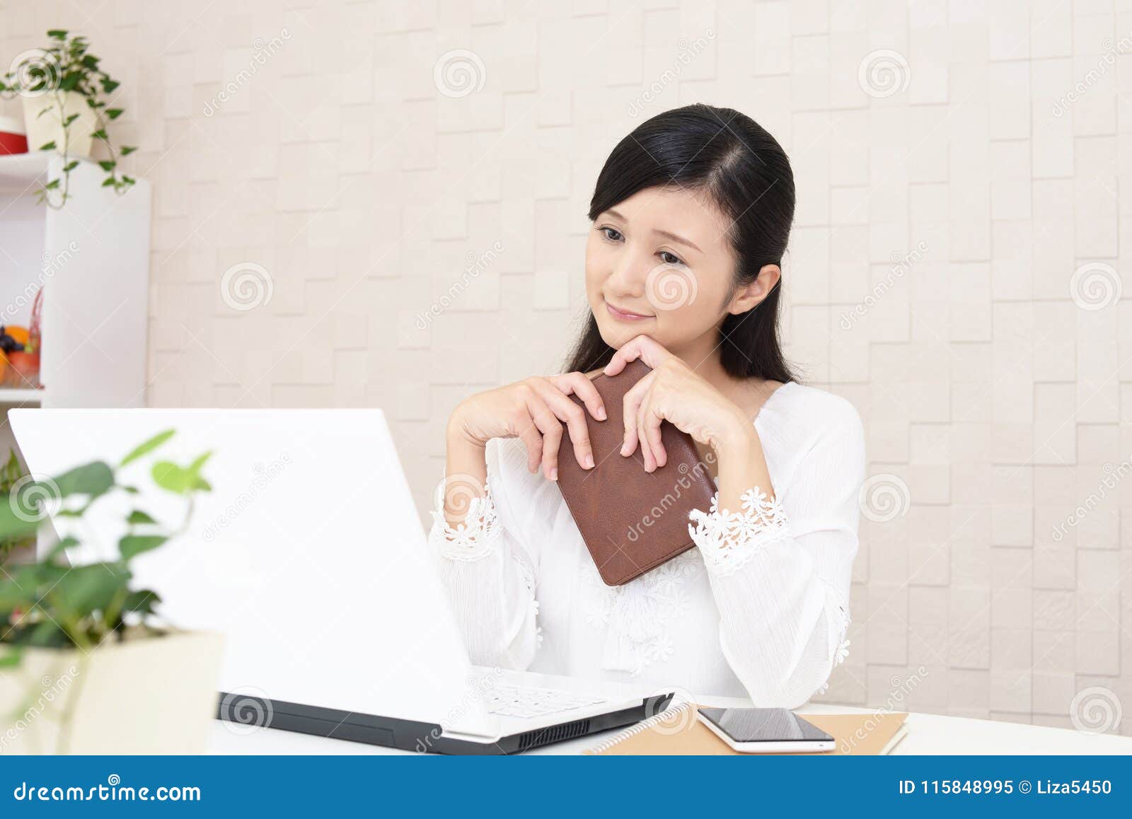 Smiling Woman Using a Laptop Stock Image - Image of japanese, elegant ...