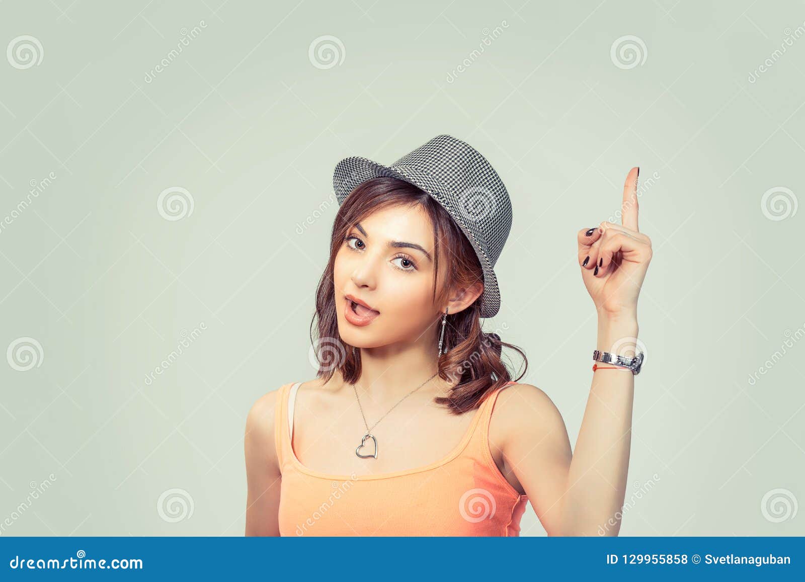 Woman Who Just Came Up with an Idea Aha, with Finger Pointing Up Stock ... Woman Who Just Came Up with an Idea Aha, with Finger Pointing Up Stock ...