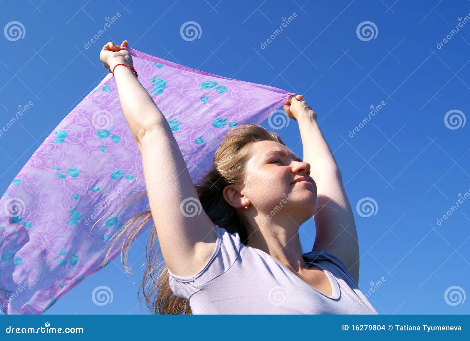 The woman on a wind stock photo. Image of look, blue - 16279804