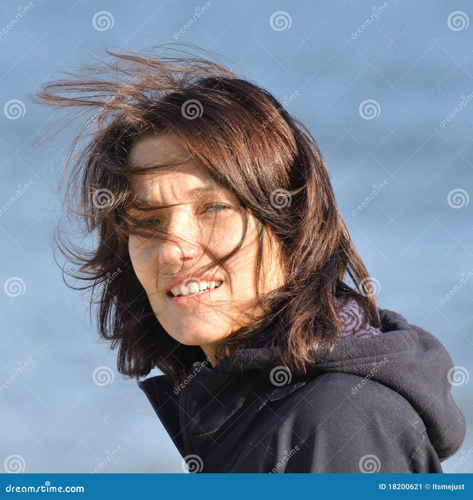 Woman and wind stock image. Image of ruffle, pretty, look - 18200621