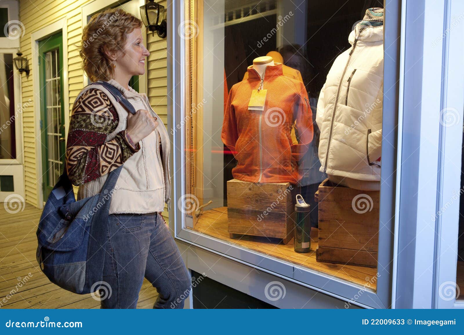 Woman window shopping stock image. Image of factory, coats - 22009633