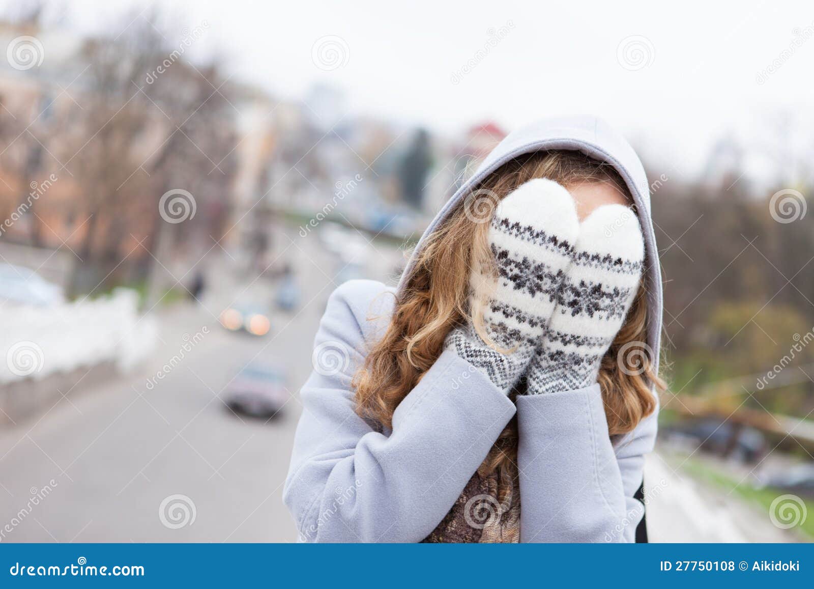 Woman in Winter Clothes Covered Face with Mittens Stock Photo - Image ...