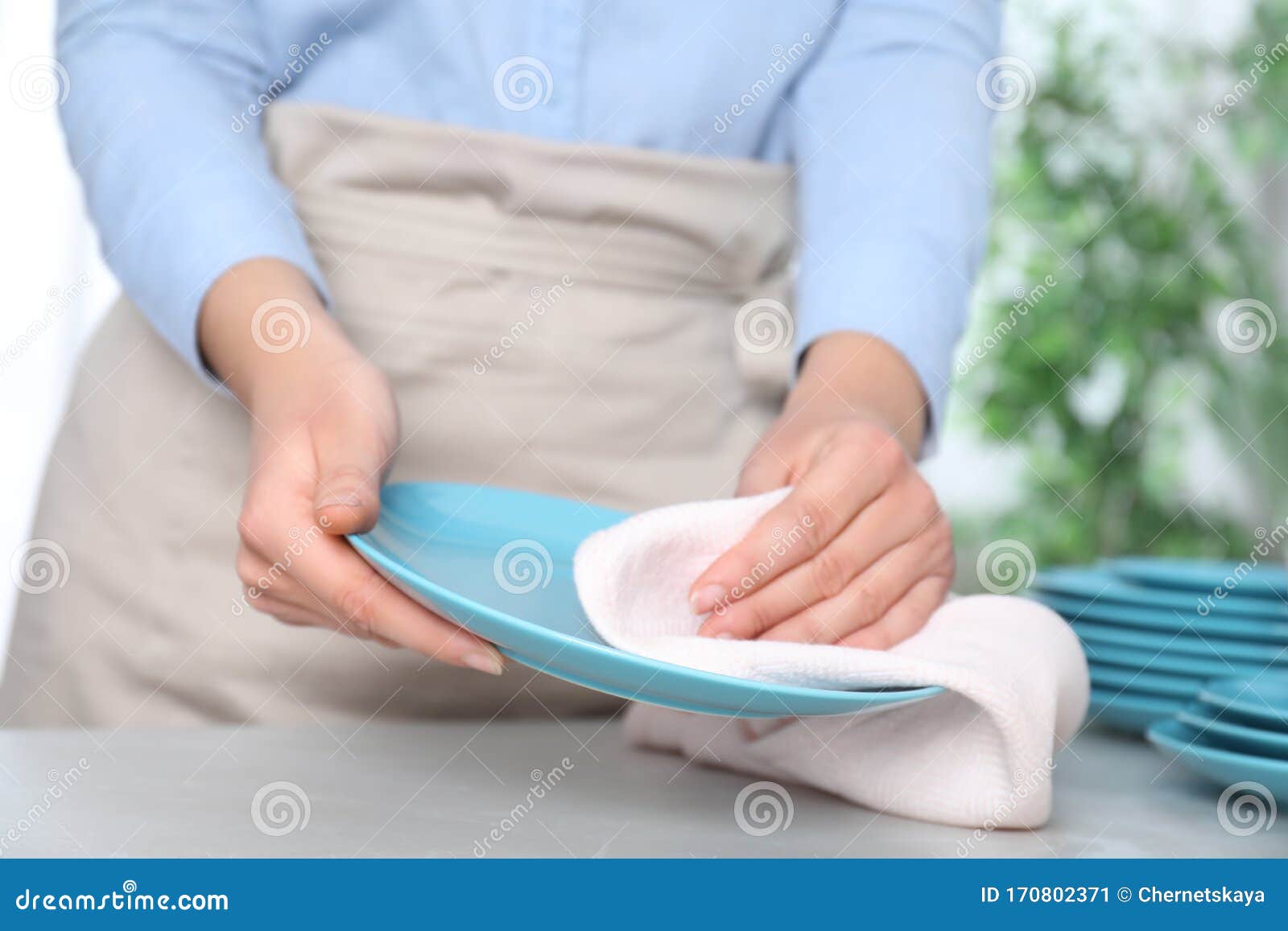 Woman Wiping Clean Plate at Table, Closeup Stock Image - Image of adult ...