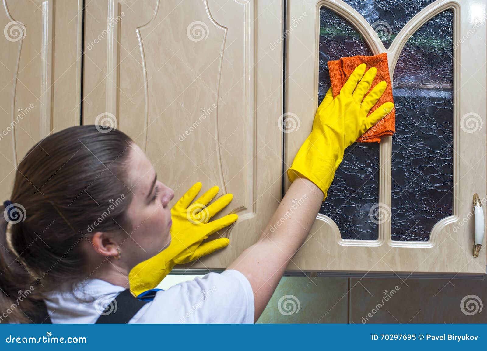 Woman Wiping Kitchen Cupboard with Rag Stock Image - Image of ...