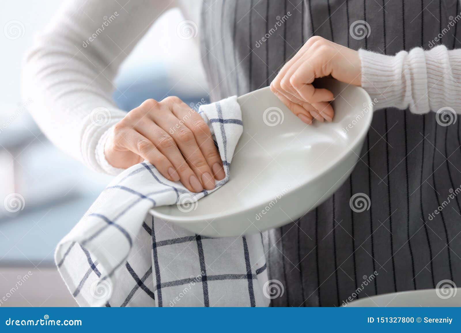 Woman Wiping Plate with Towel in Kitchen Stock Photo - Image of room ...