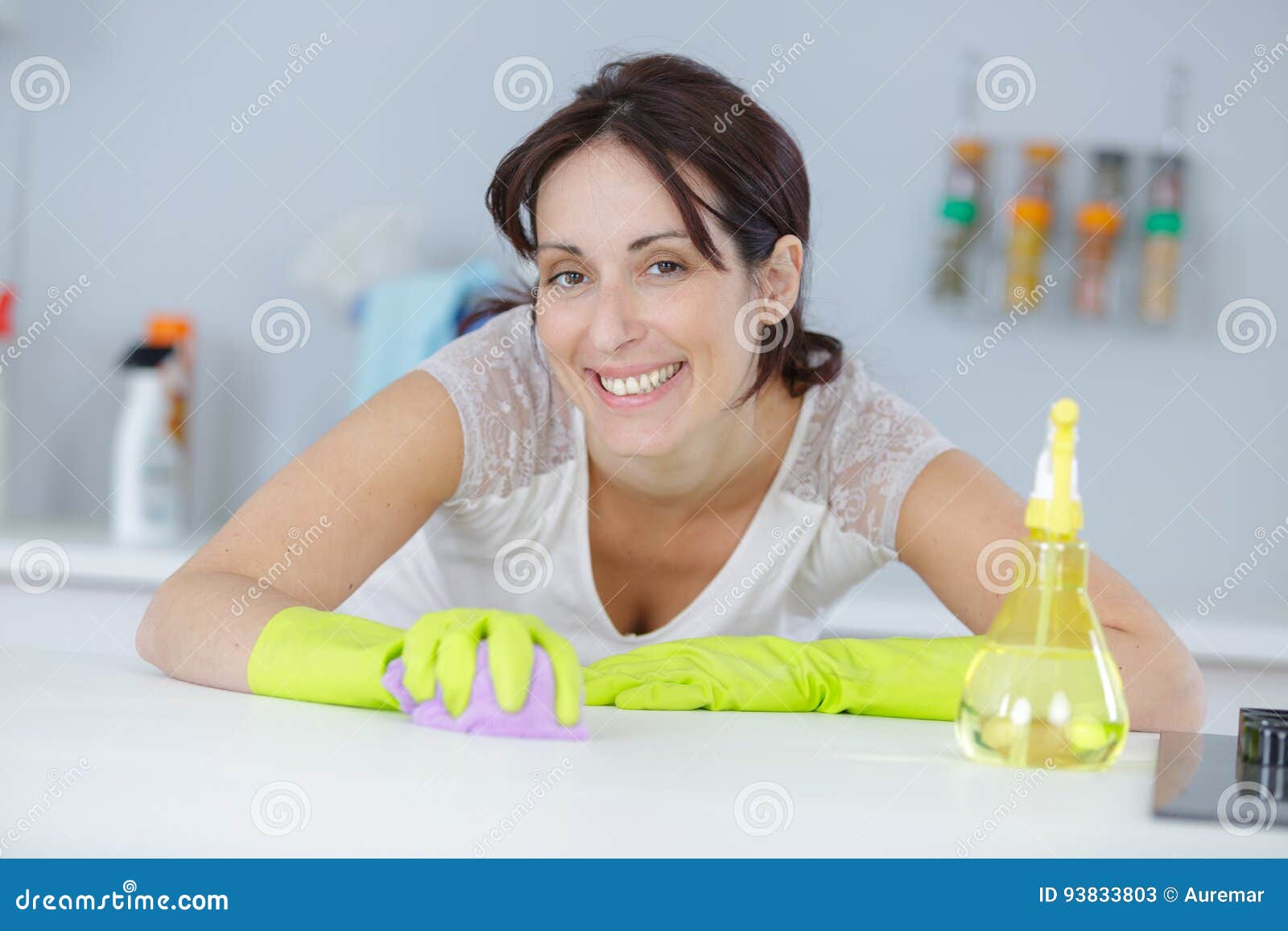 Woman wiping table top stock image. Image of spray, deal - 93833803