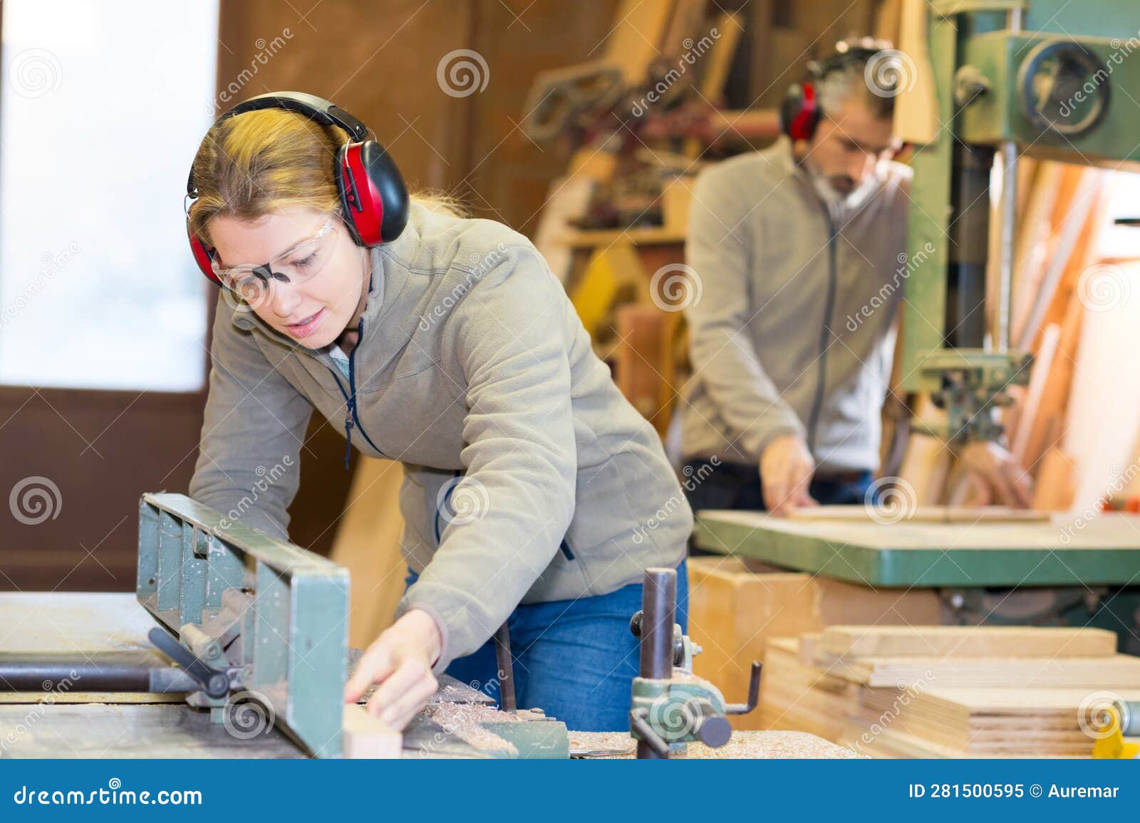Woman and wood sanding stock image. Image of workbench - 281500595