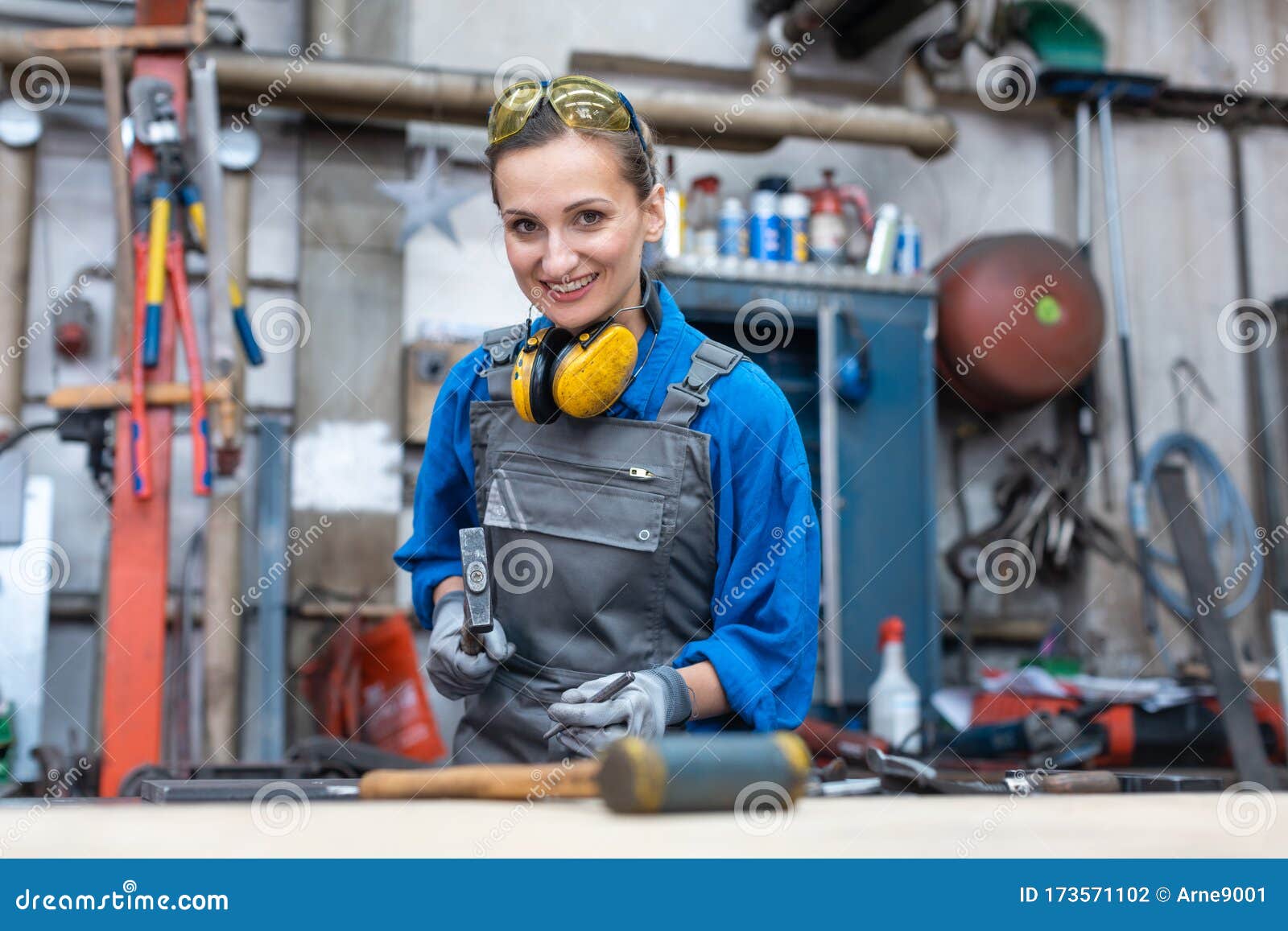 Woman Worker Marking Workpiece in Her Workshop Stock Photo - Image of ...