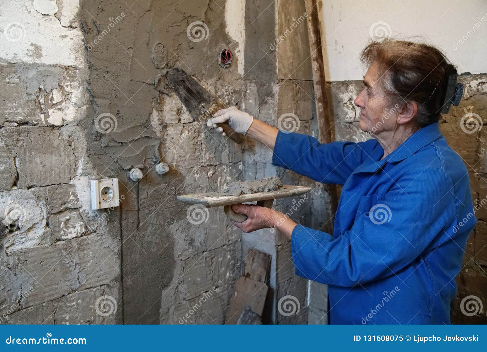 Woman Worker Plastering Concrete at Wall of House Stock Image - Image ...