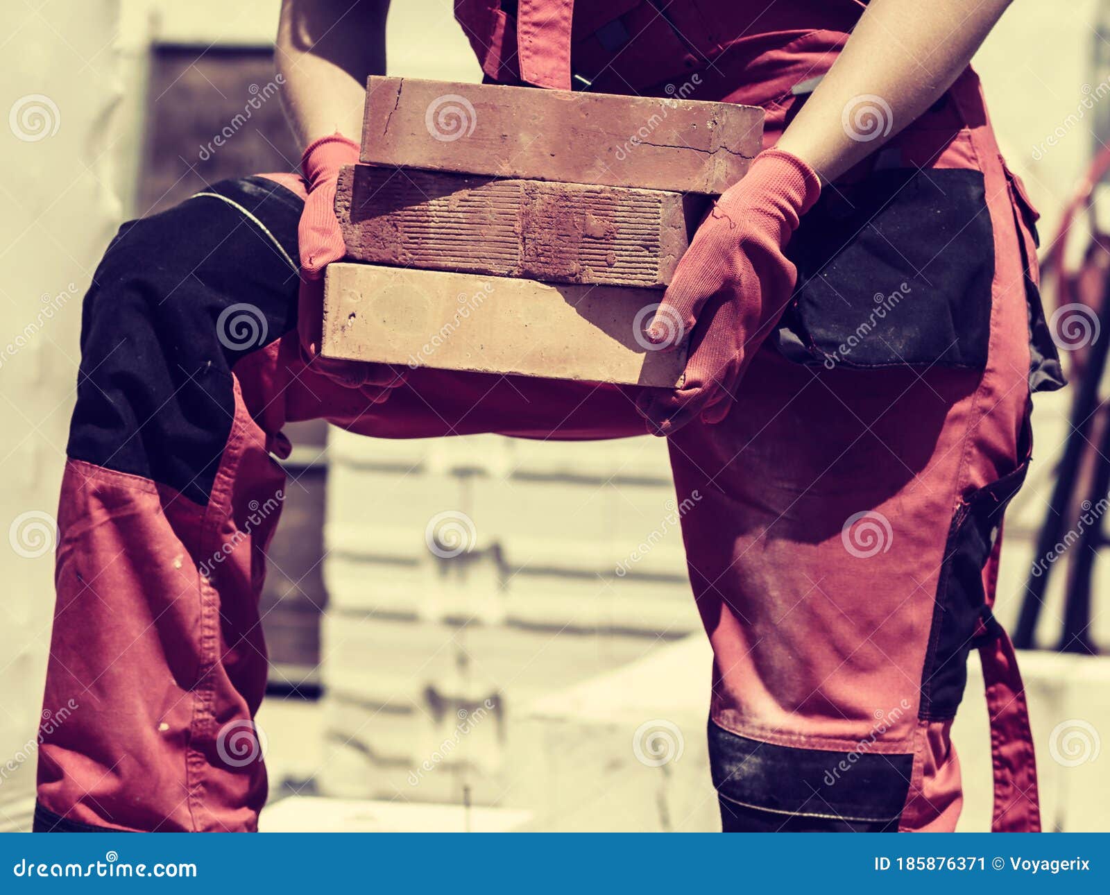 Woman working with bricks stock image. Image of industry - 185876371