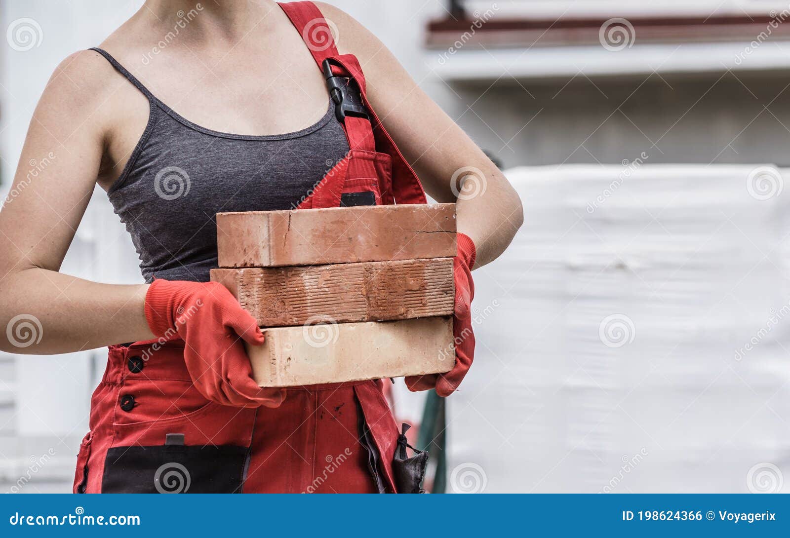Woman working with bricks stock photo. Image of employee - 198624366