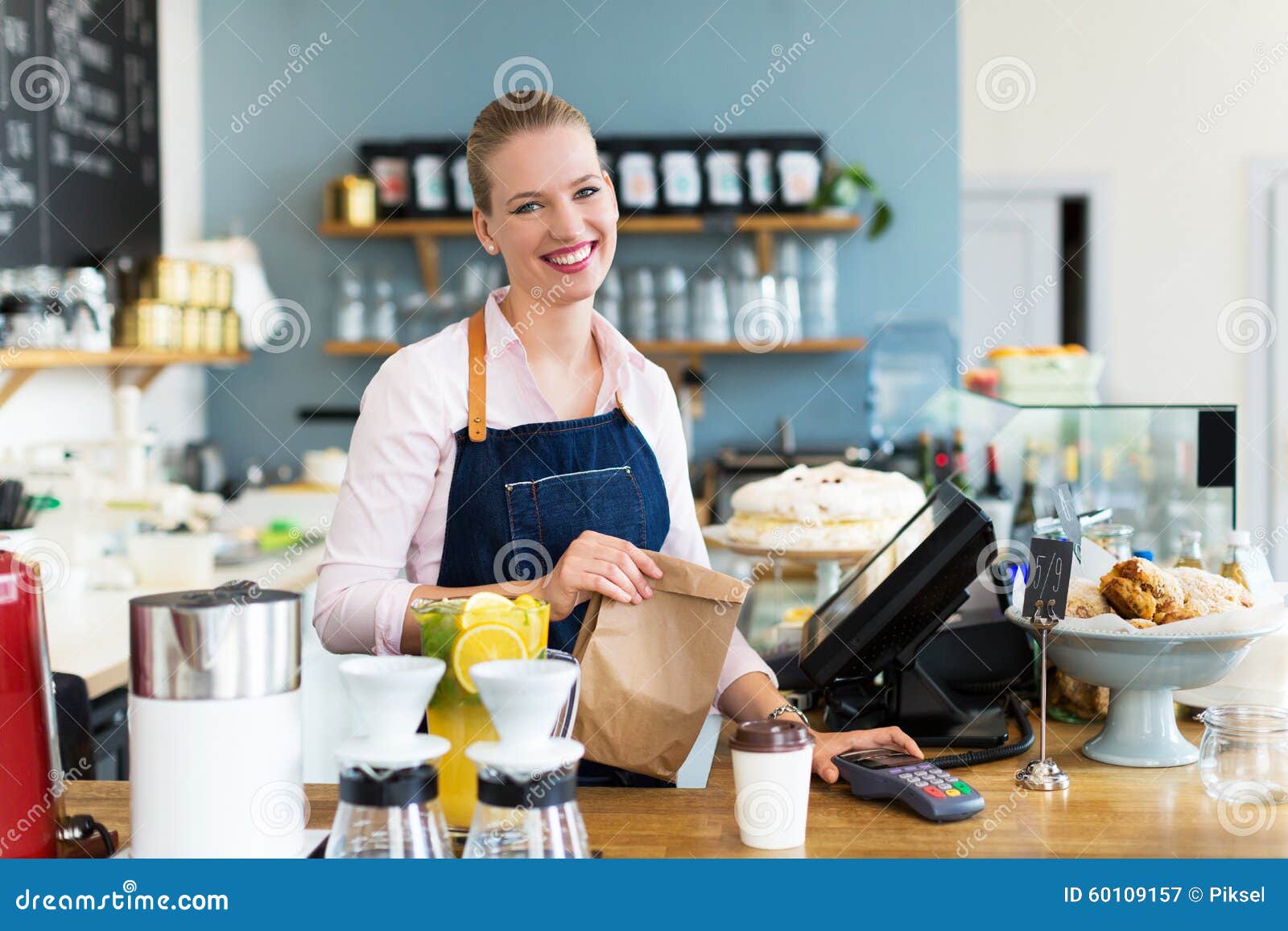 Woman working at cafe stock image. Image of holding, drink - 60109157