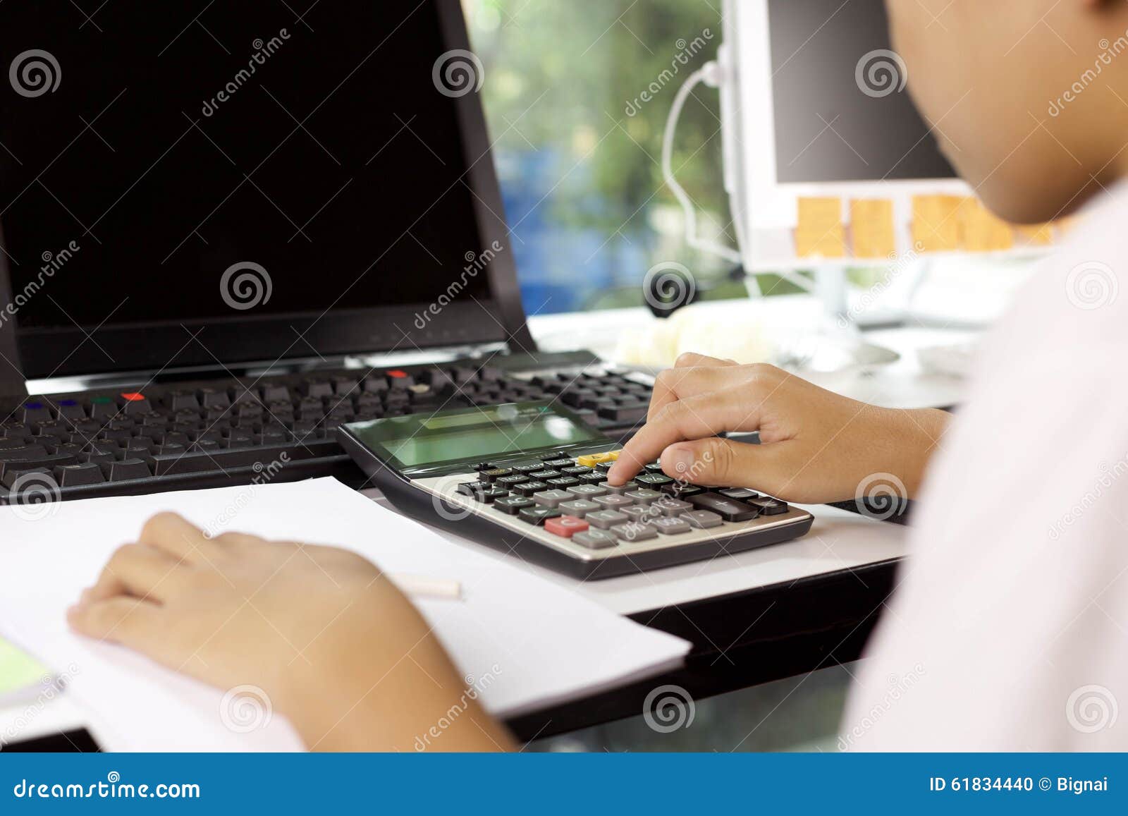 Woman Working on Calculator Stock Photo - Image of adult, document ...