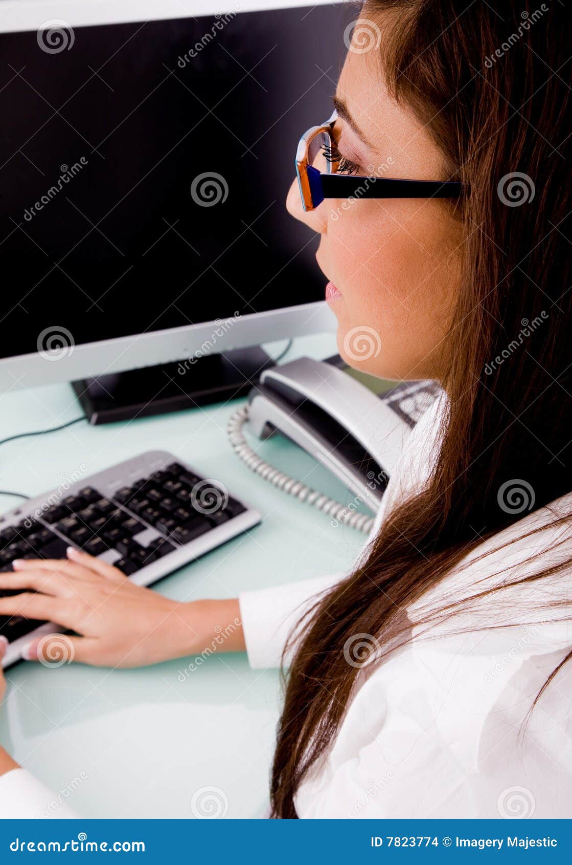 Woman working on computer stock photo. Image of studio - 7823774