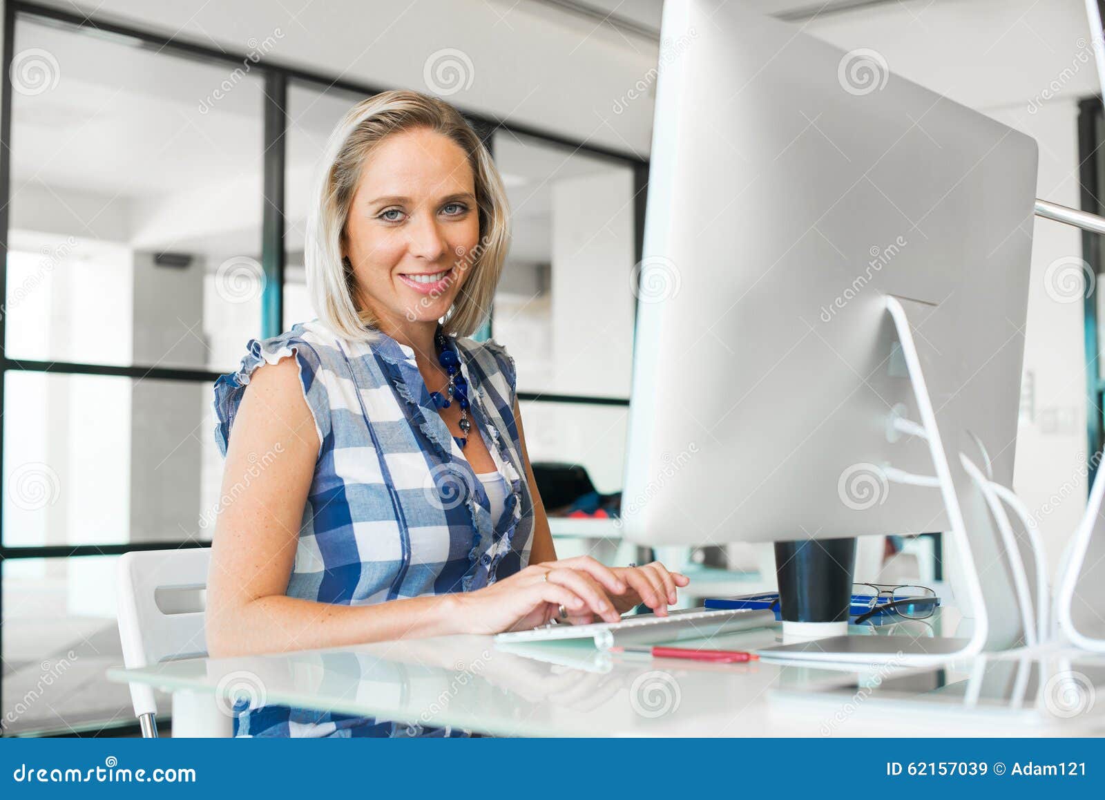 Woman working on computer stock image. Image of pretty - 62157039