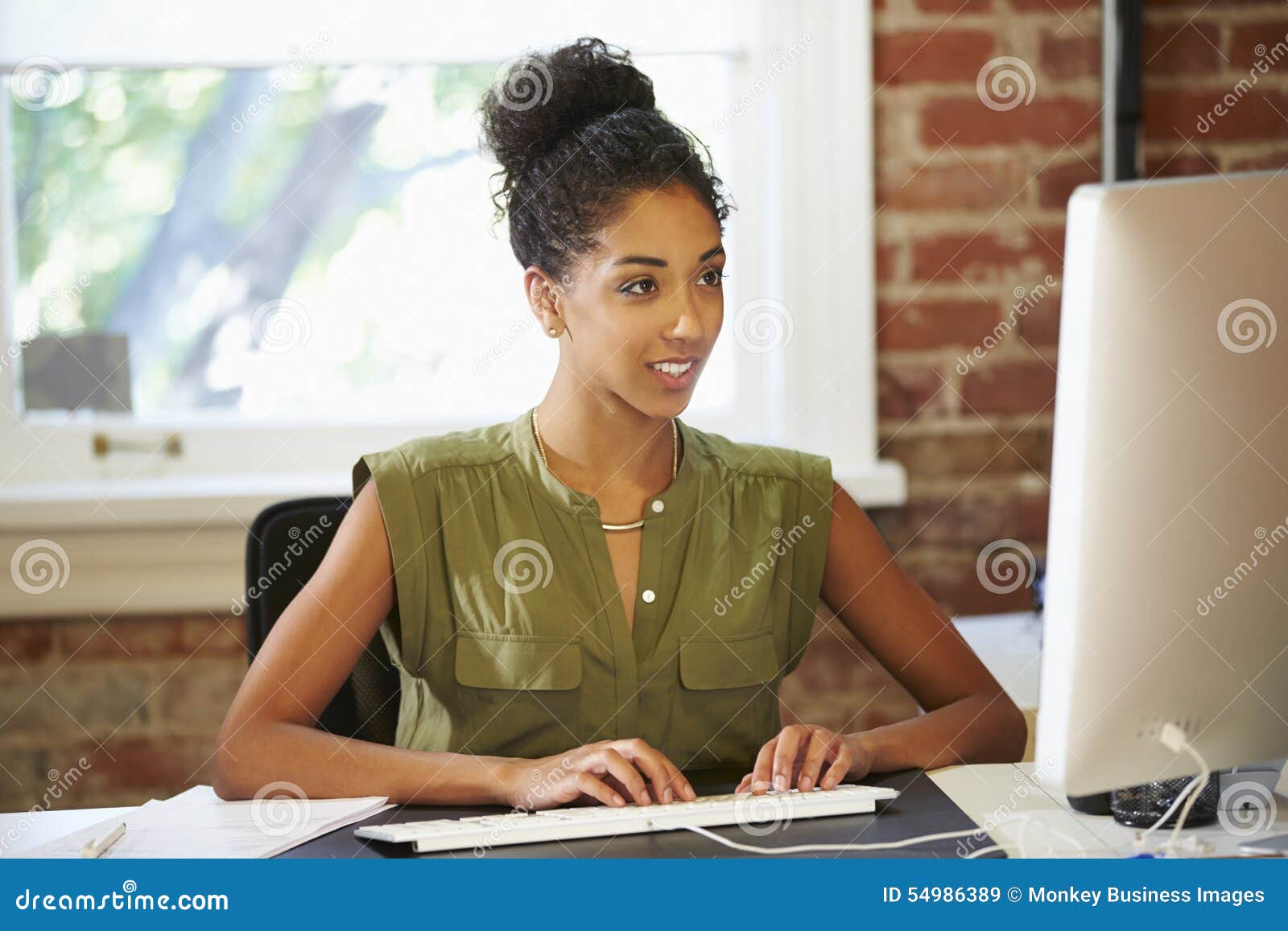 Woman Working at Computer in Contemporary Office Stock Image - Image of ...