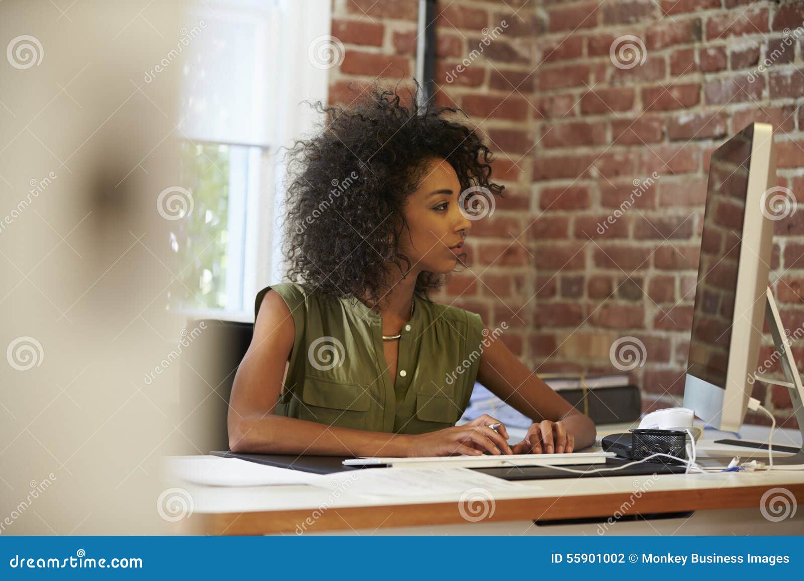 Woman Working at Computer in Contemporary Office Stock Photo - Image of ...
