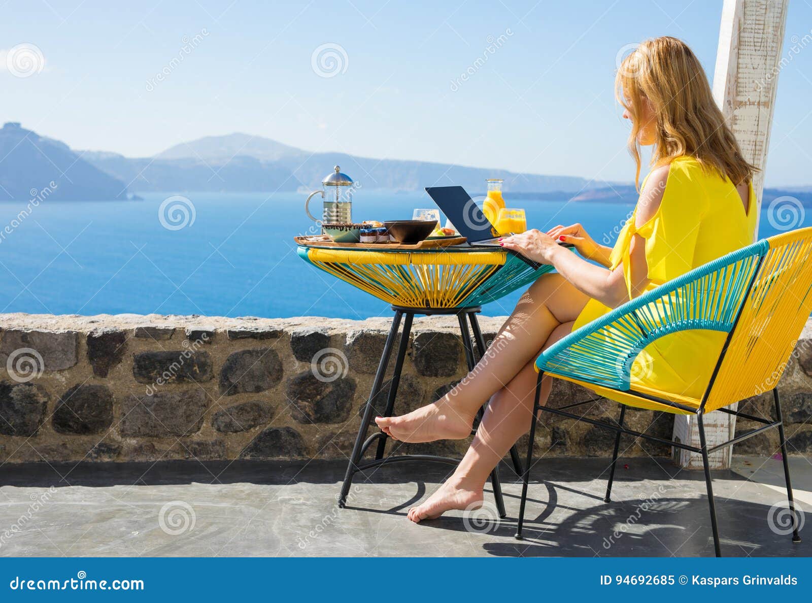 Woman Working on Computer while on Vacation in Mediterranean Stock ...